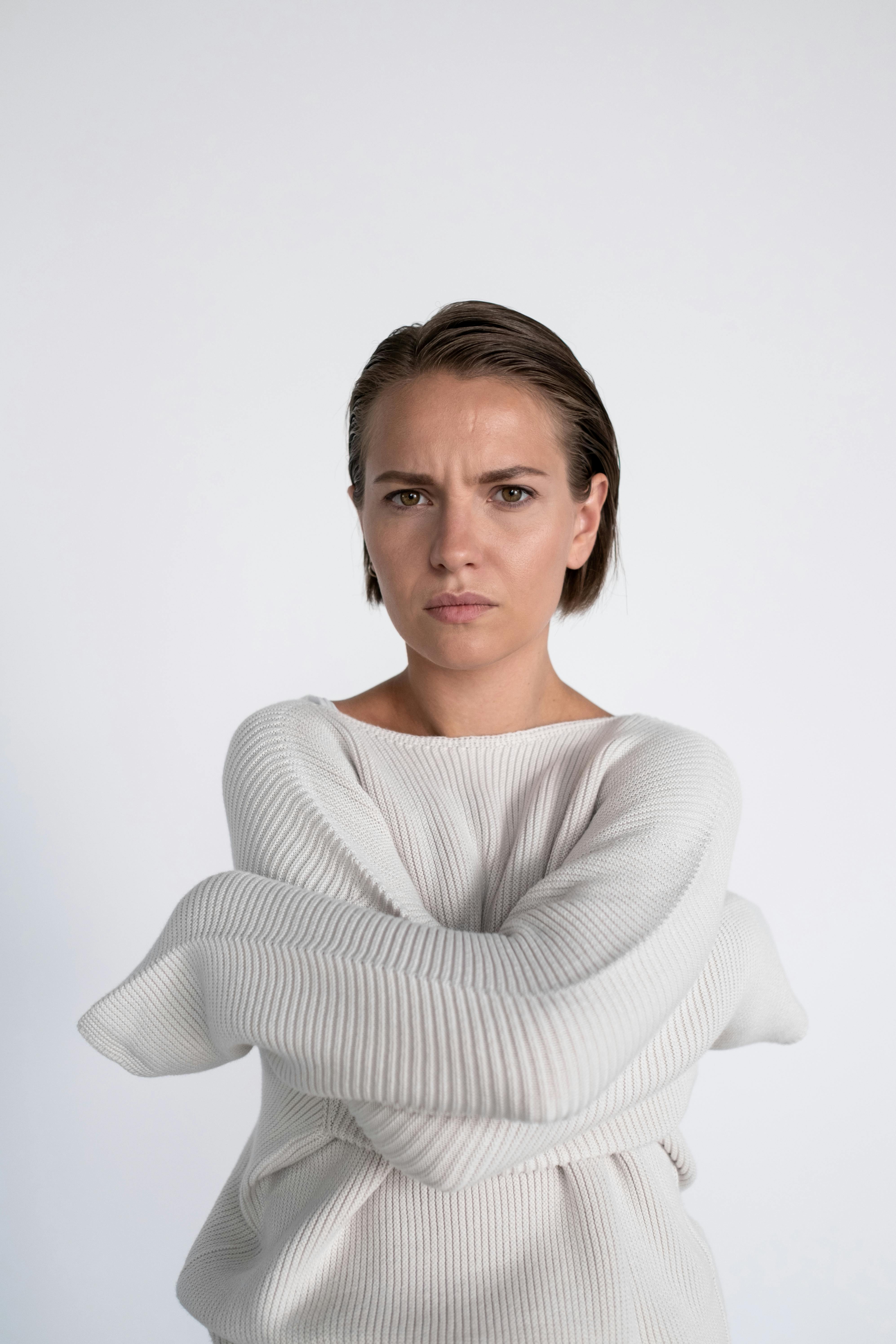 A Portrait of a Woman with a Confused Facial Expression · Free Stock Photo