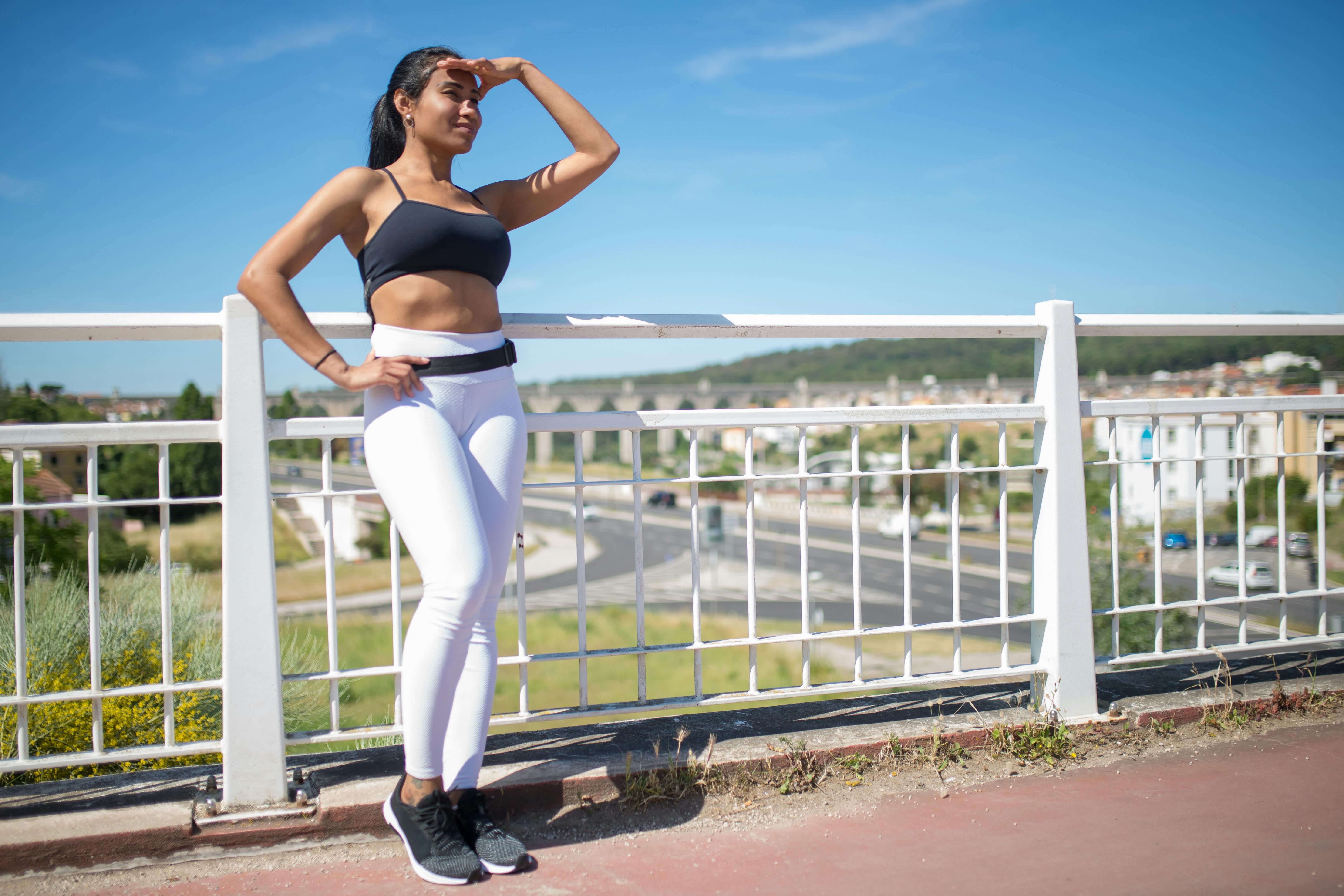 A Happy Woman in Activewear · Free Stock Photo