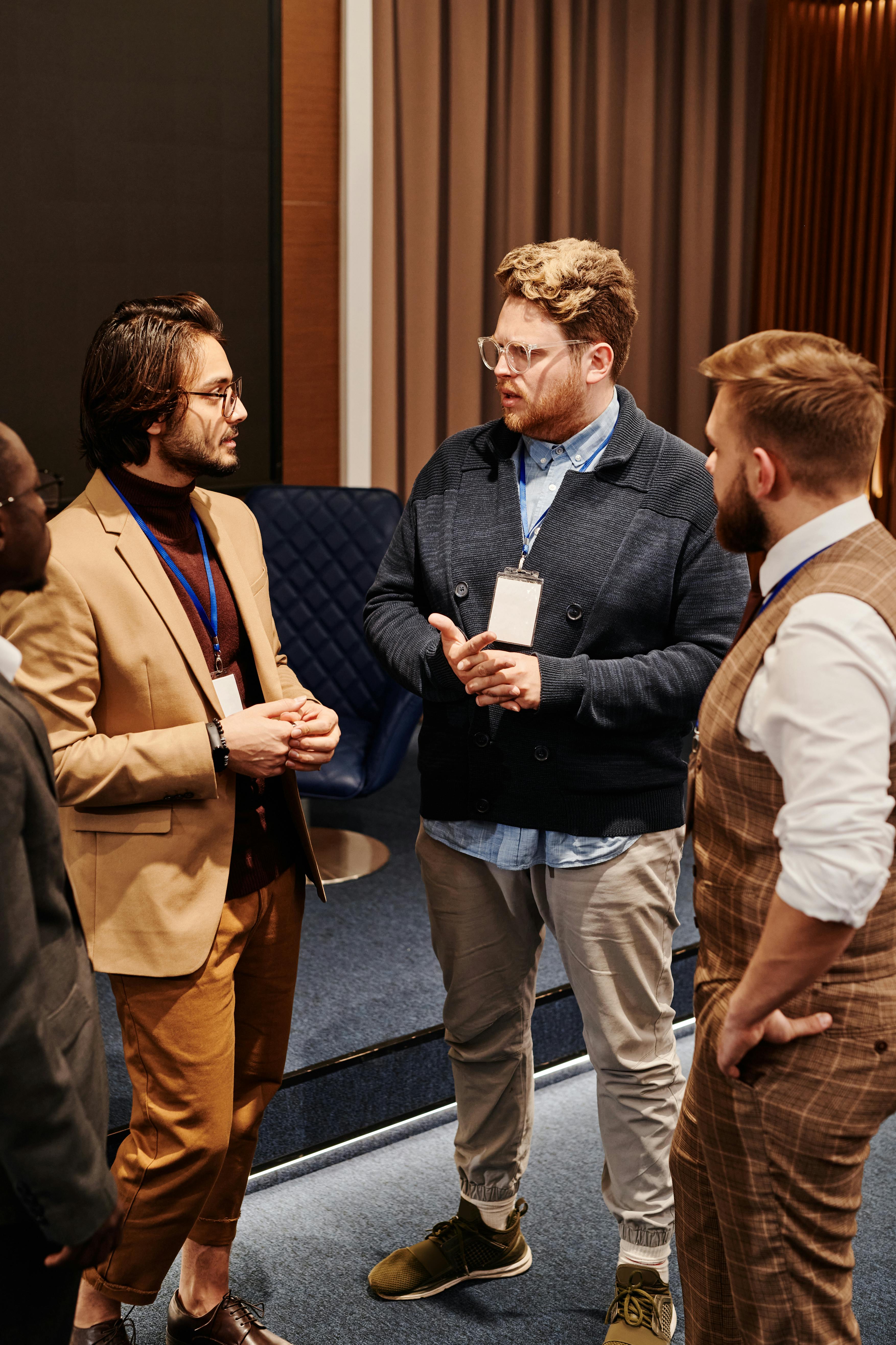 Two Men Walking Inside Building · Free Stock Photo
