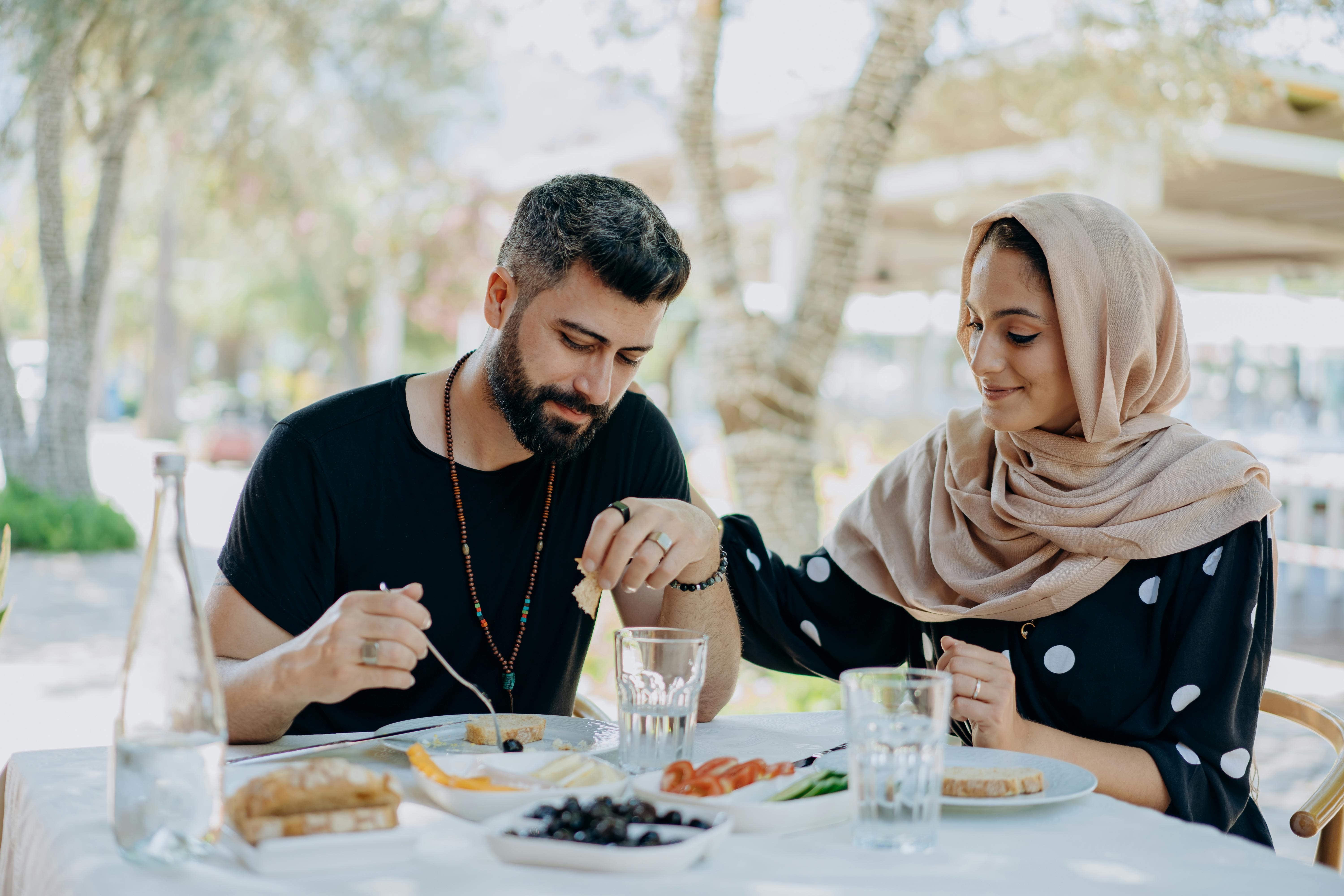 A Couple Eating on a Date · Free Stock Photo