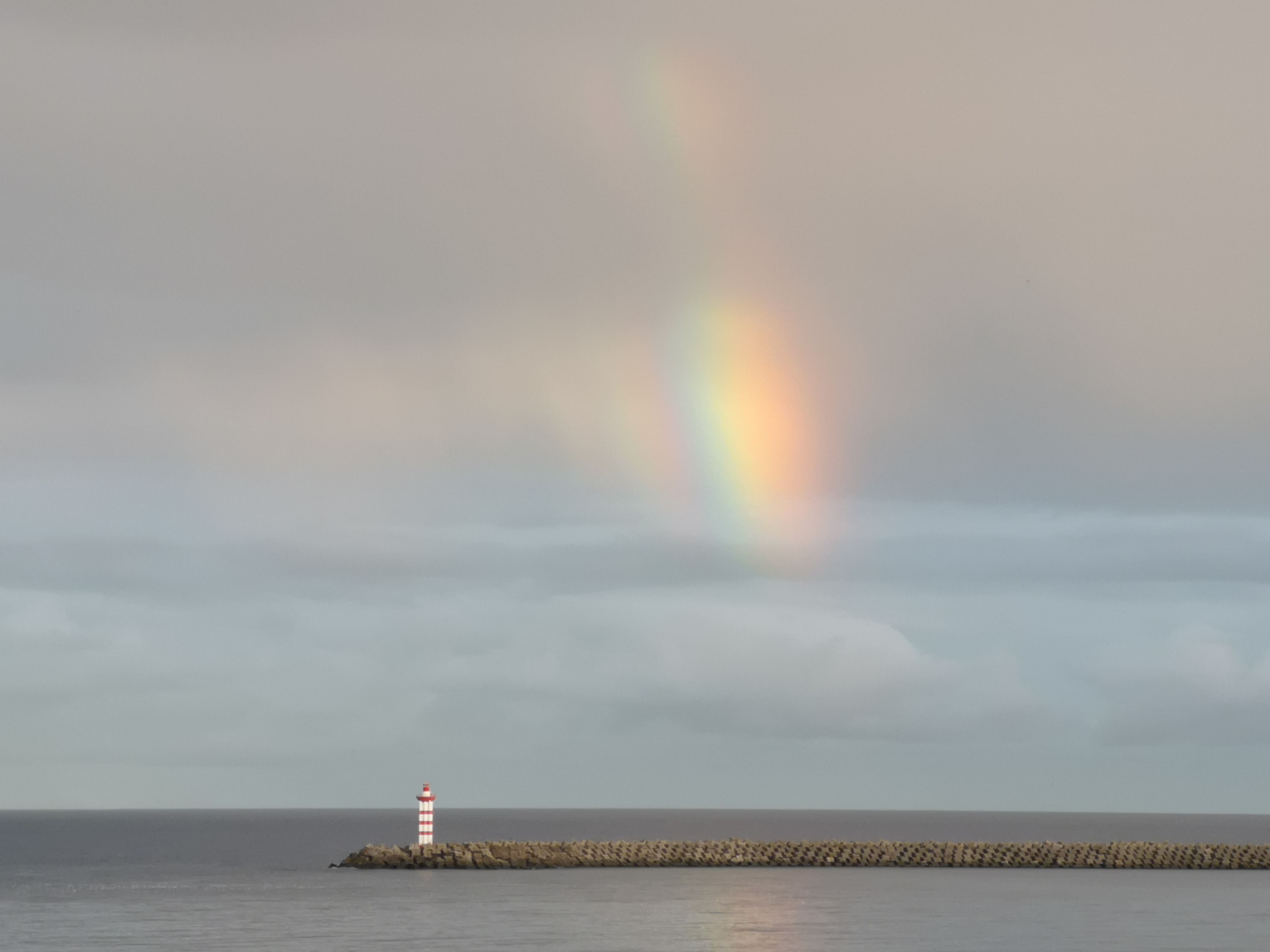 A Rainbow over a Lighthouse · Free Stock Photo