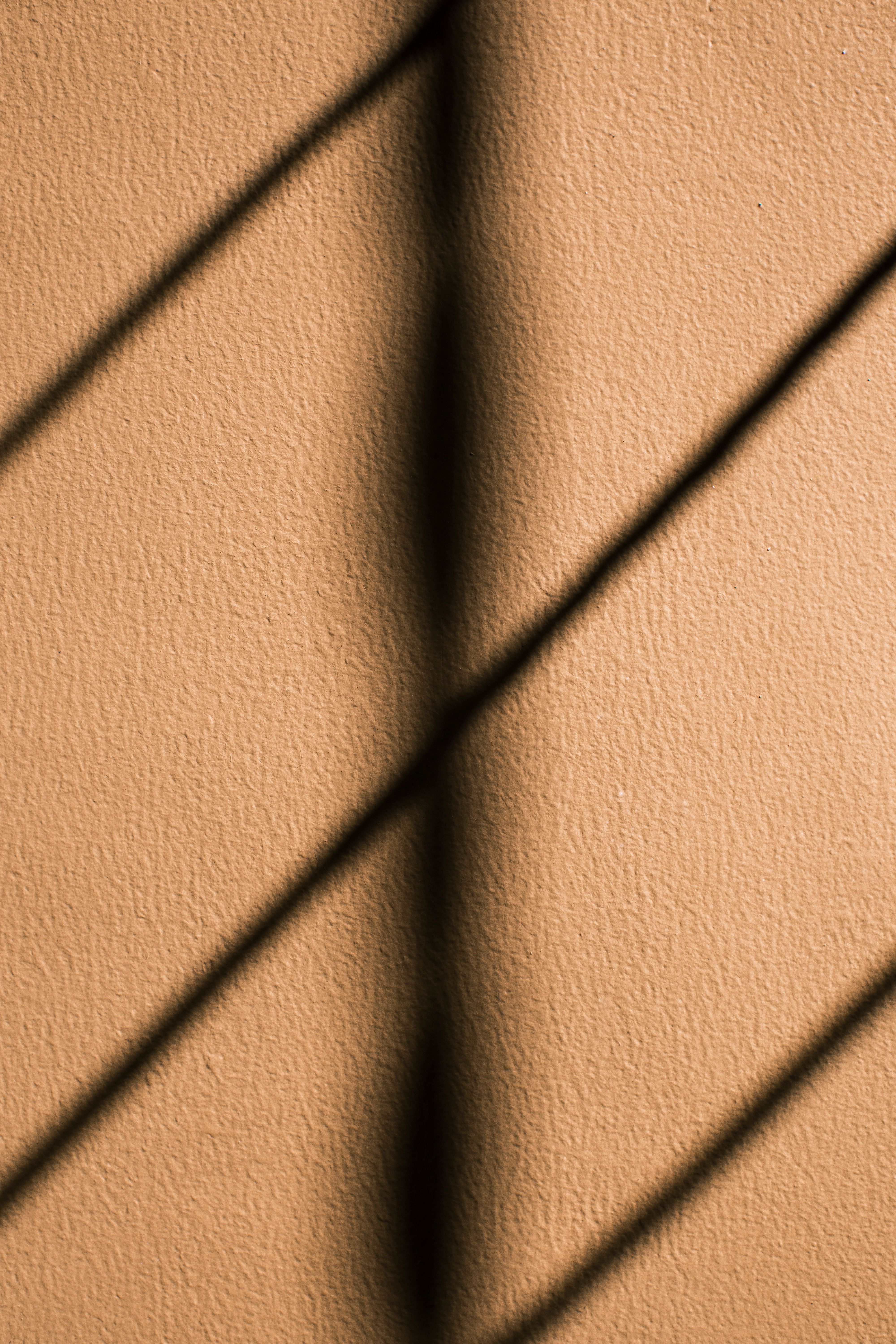 Shadow and Sunlight on Wall · Free Stock Photo