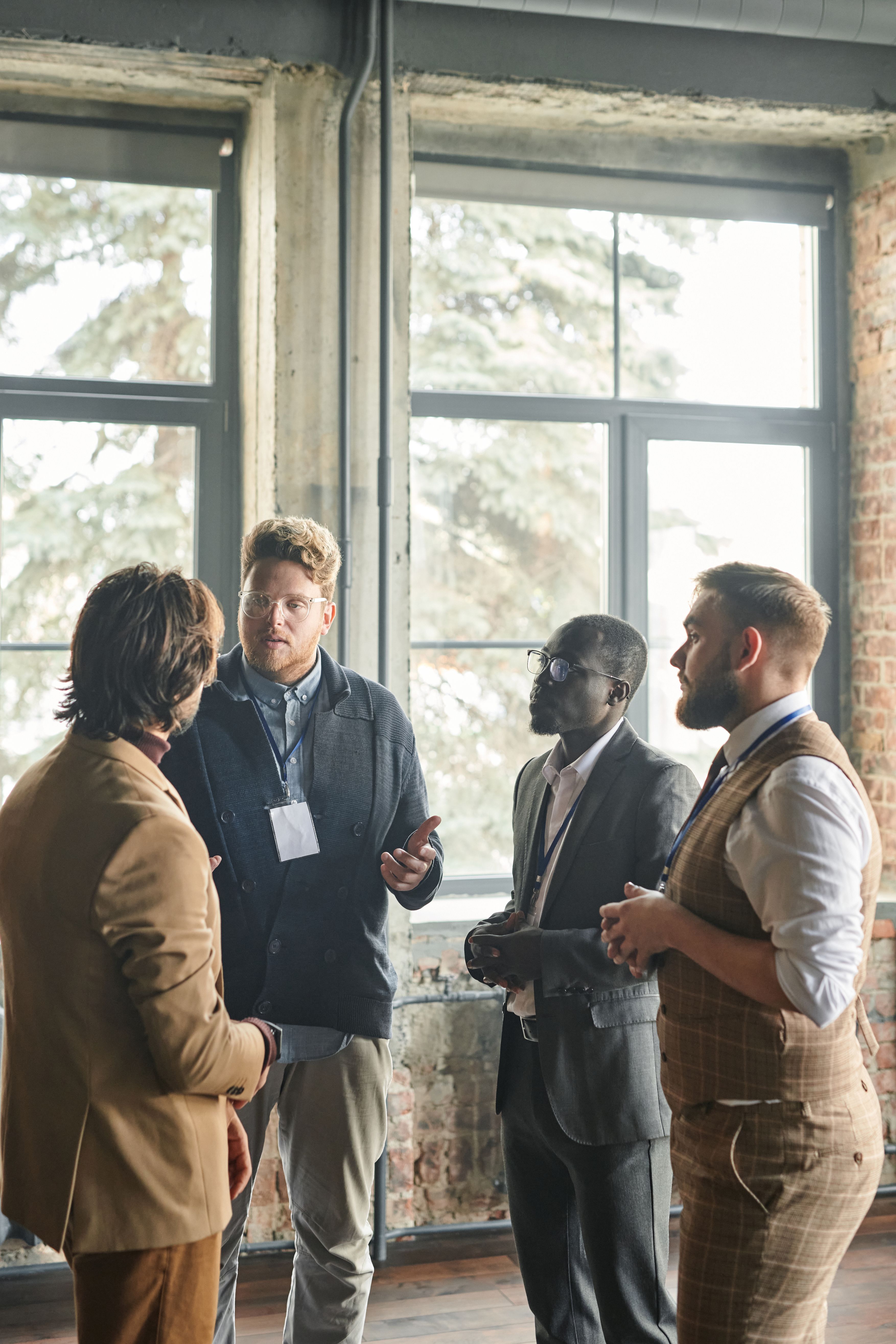 Men Standing Beside Each Other · Free Stock Photo