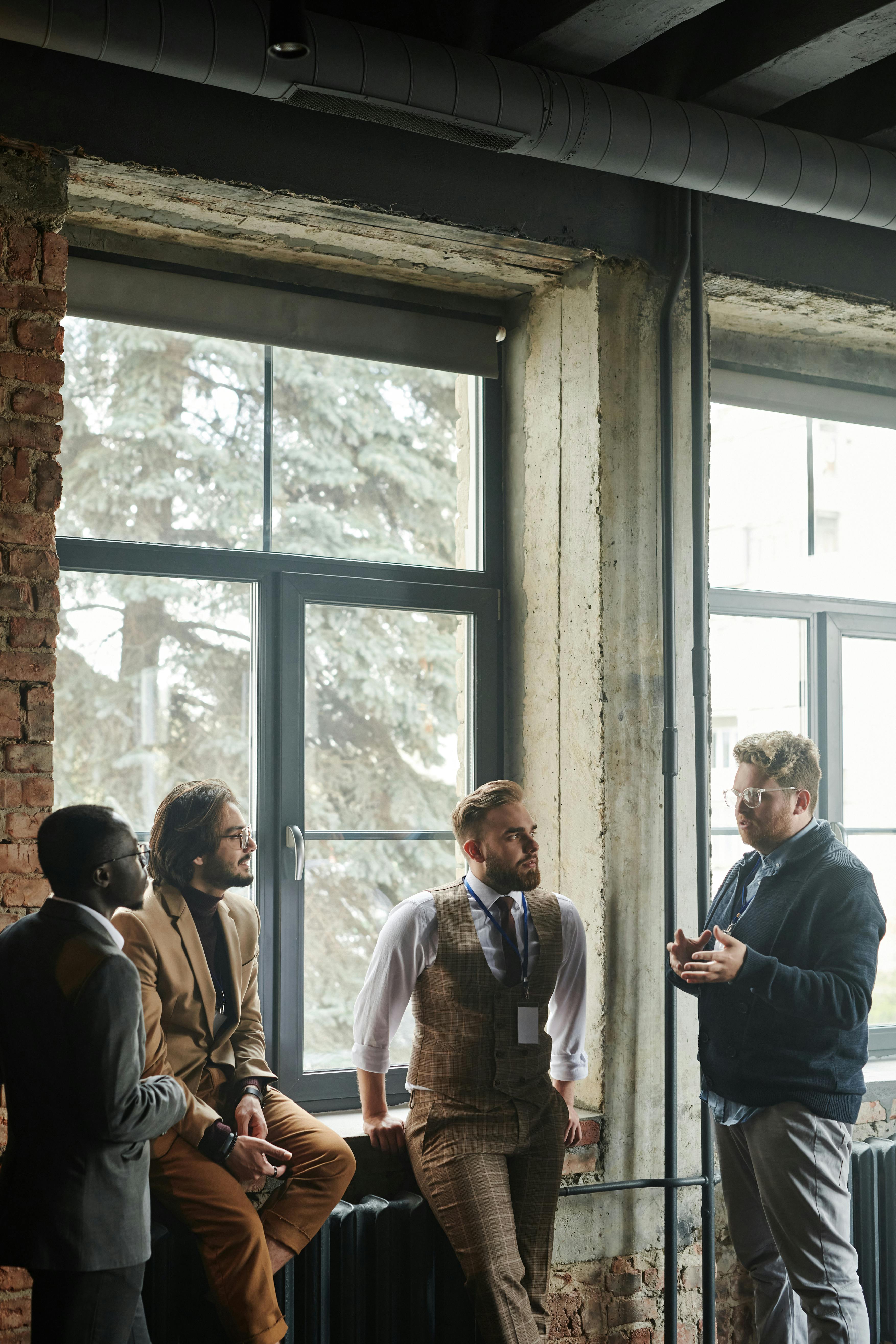 A Group of Men Having Conversation · Free Stock Photo