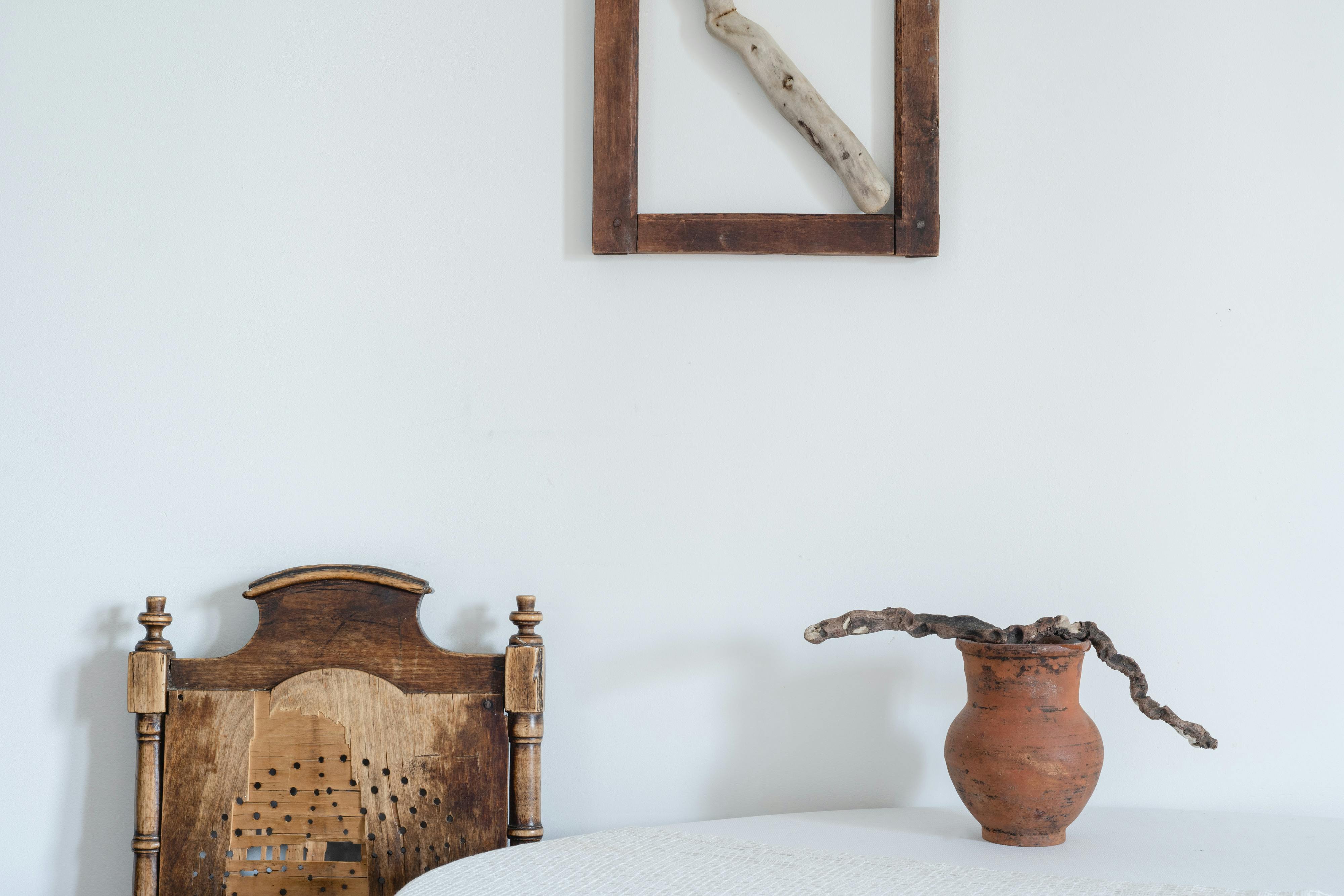 A Tree Branch on a Clay Pot · Free Stock Photo