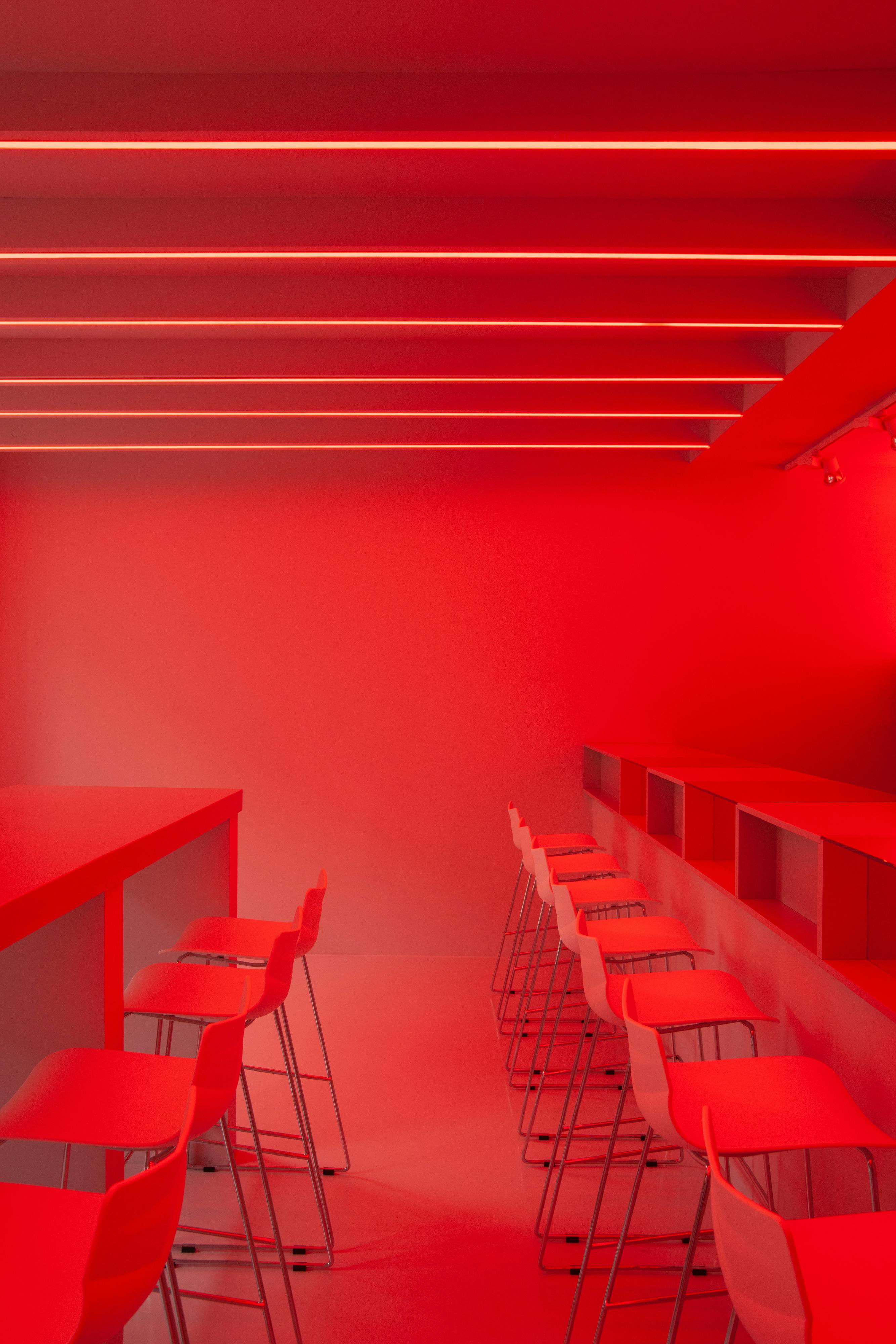 Chairs Under Red Light · Free Stock Photo