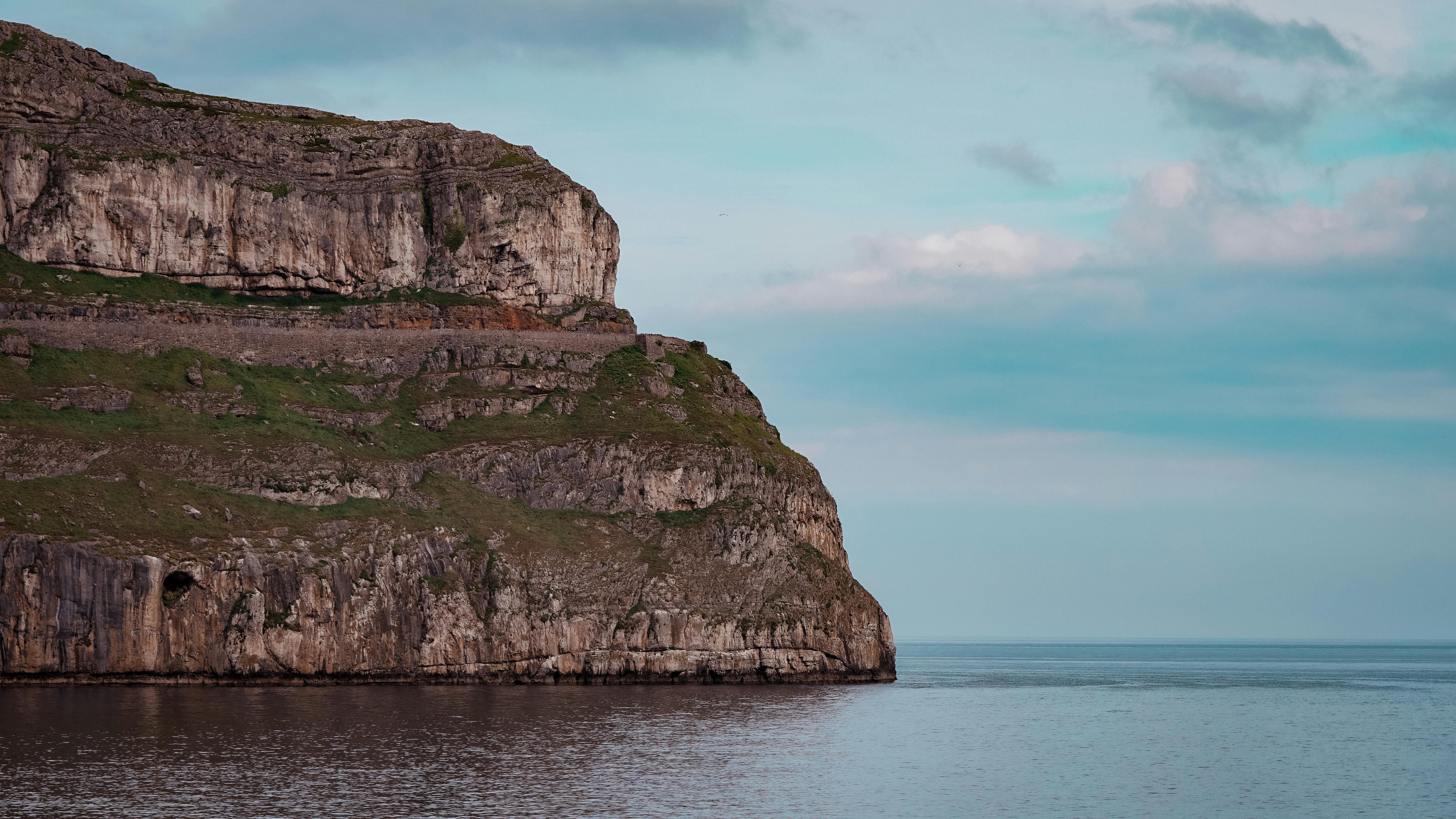 Rocky Cliff near the Ocean · Free Stock Photo