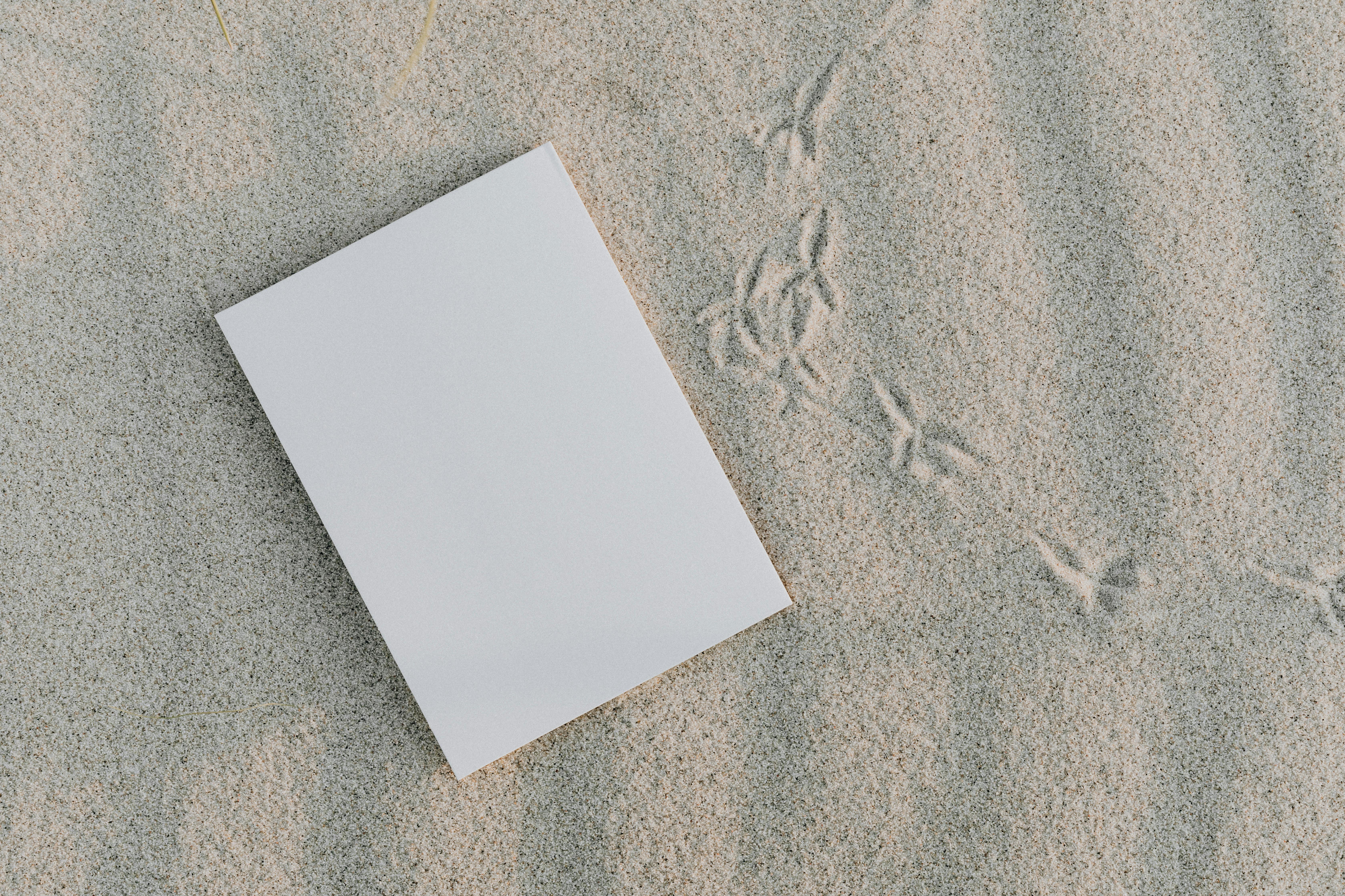 A Paper on the Sand · Free Stock Photo