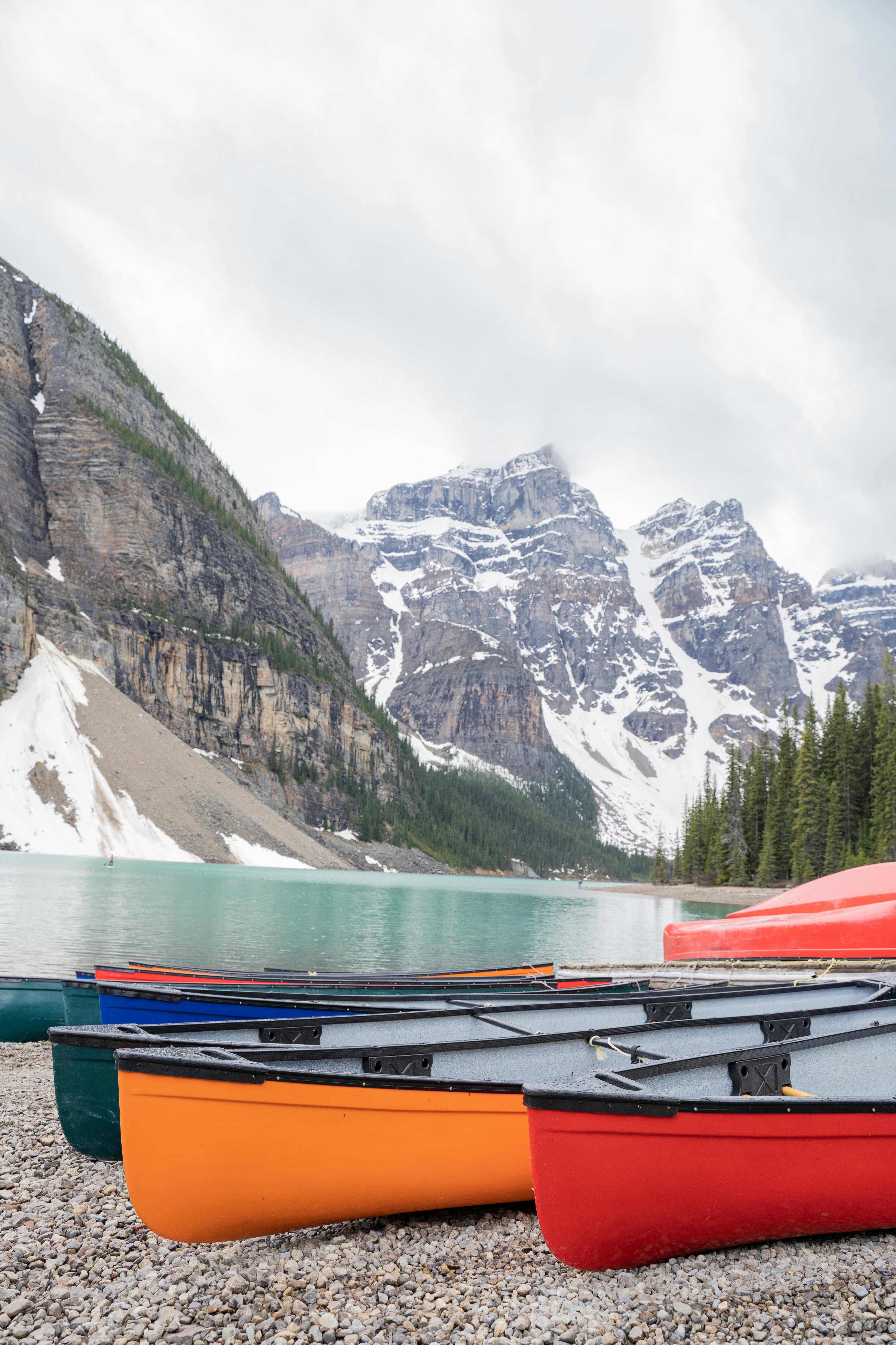Canoes by Lake · Free Stock Photo