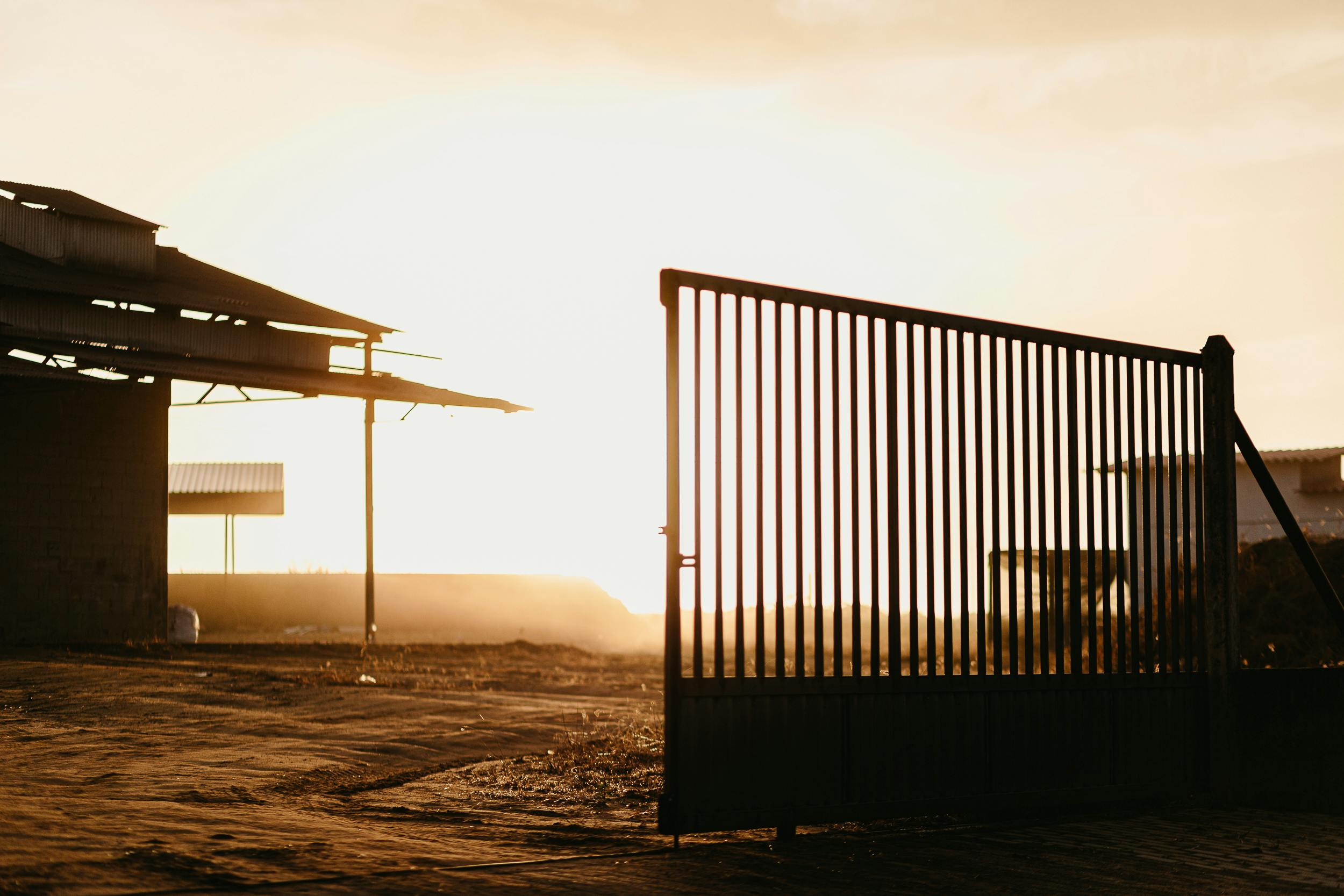 Photo of a Gate at Sunset · Free Stock Photo