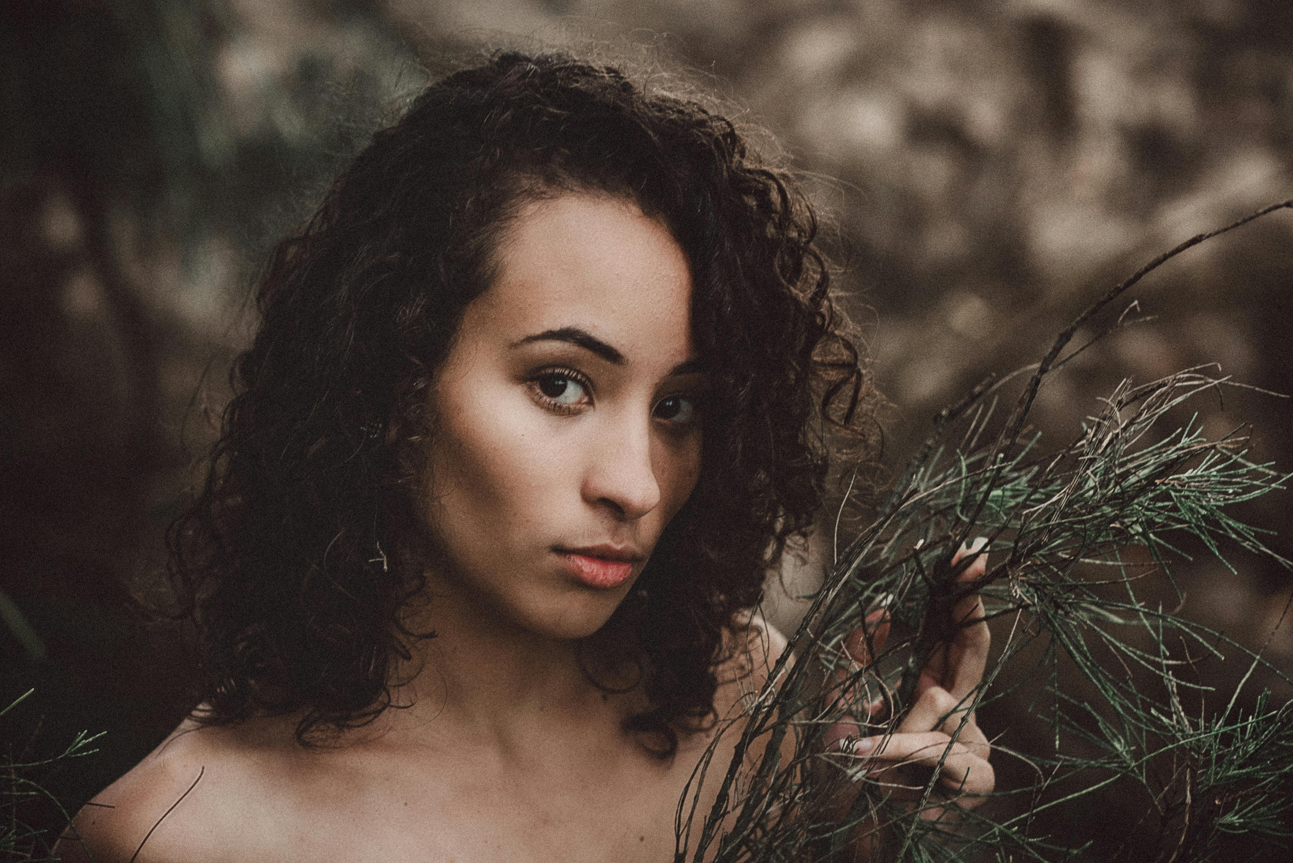 Portrait of a Beautiful Girl with Curly Hair · Free Stock Photo