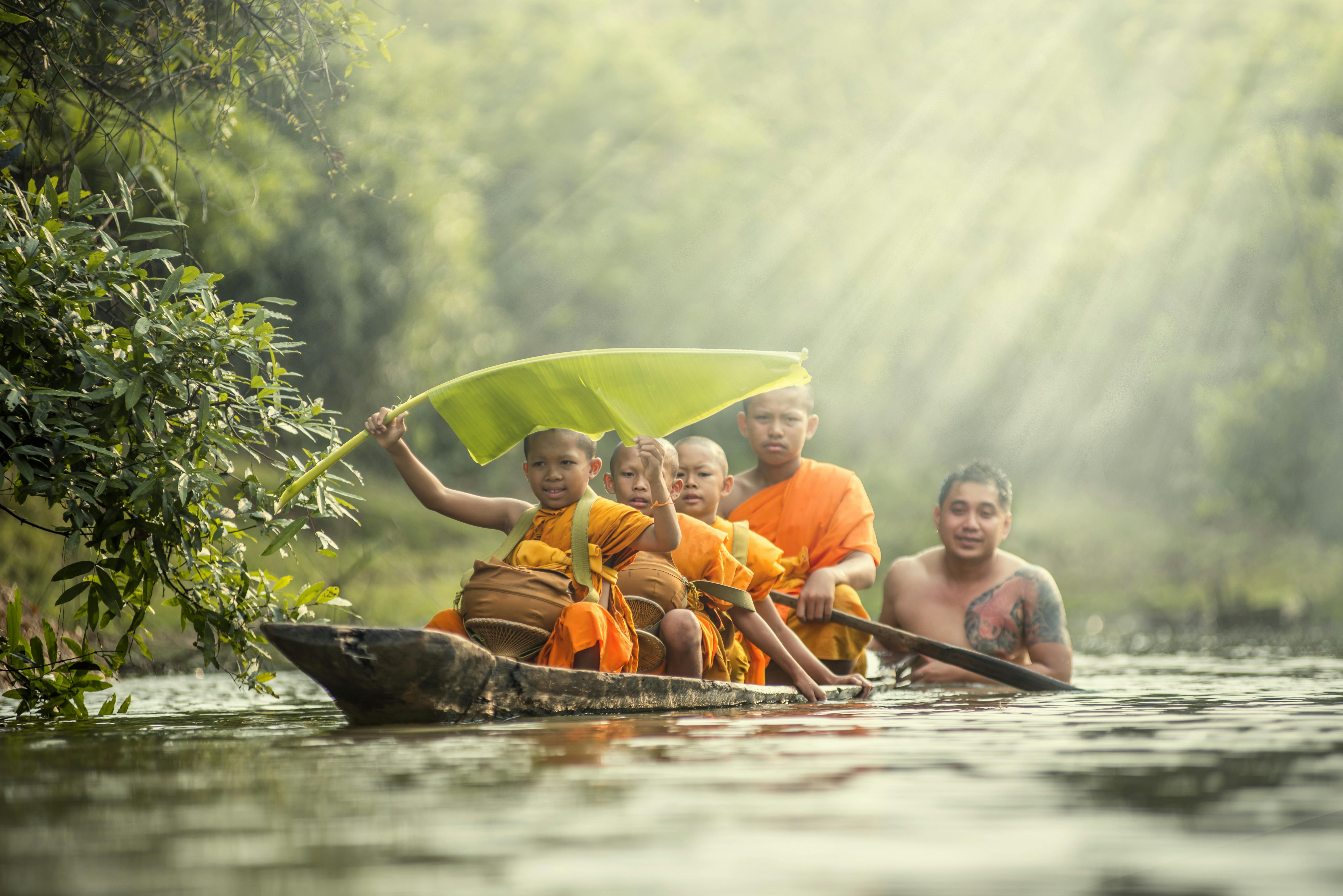 Children Riding a Wooden Boat · Free Stock Photo