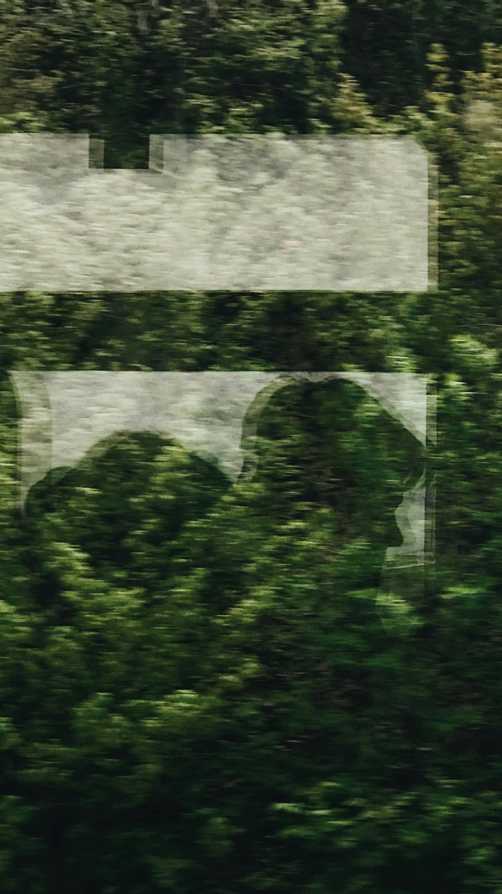 People Reflection in Train Window · Free Stock Photo