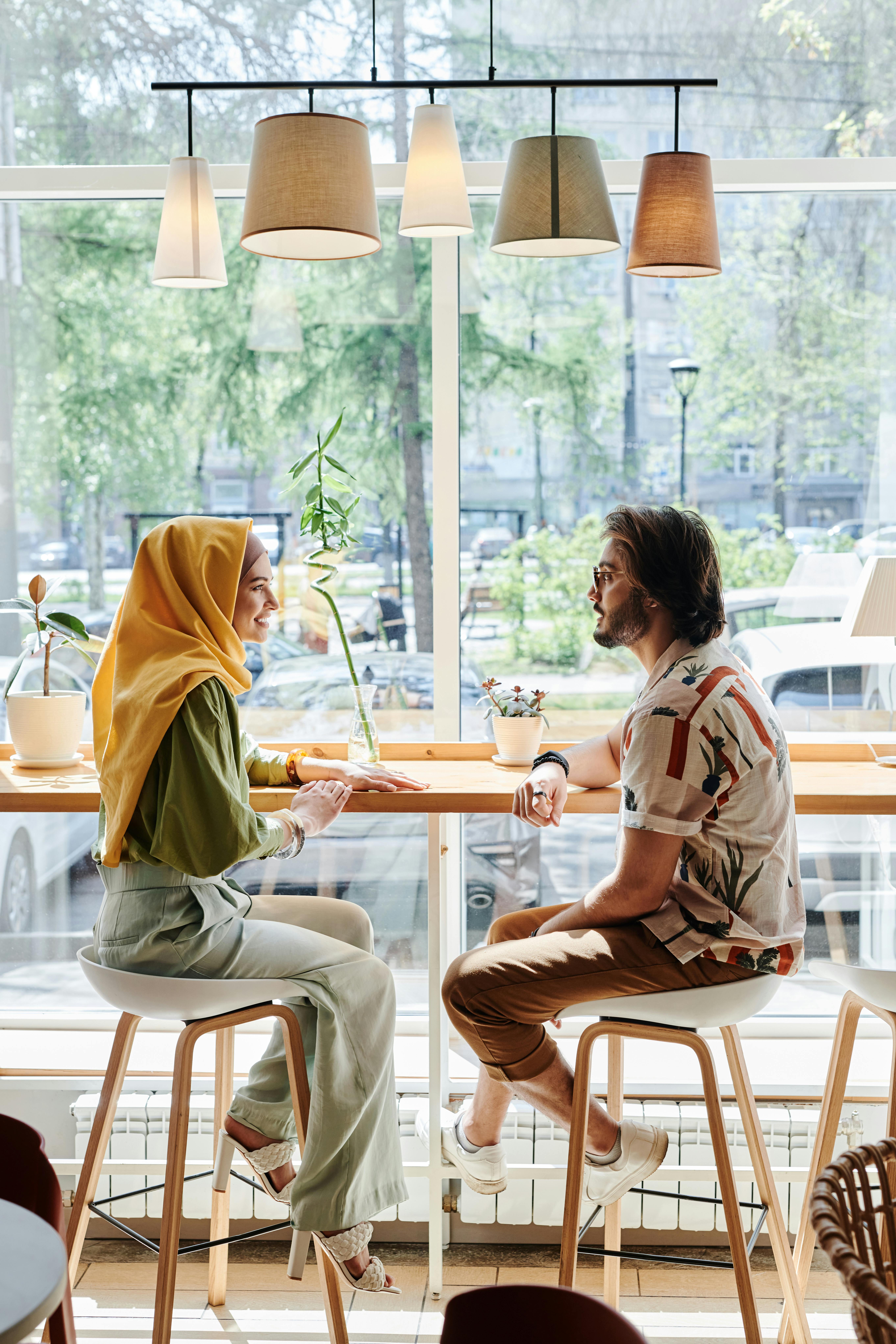 Anonymous Muslim people walking on street near shabby buildings · Free ...