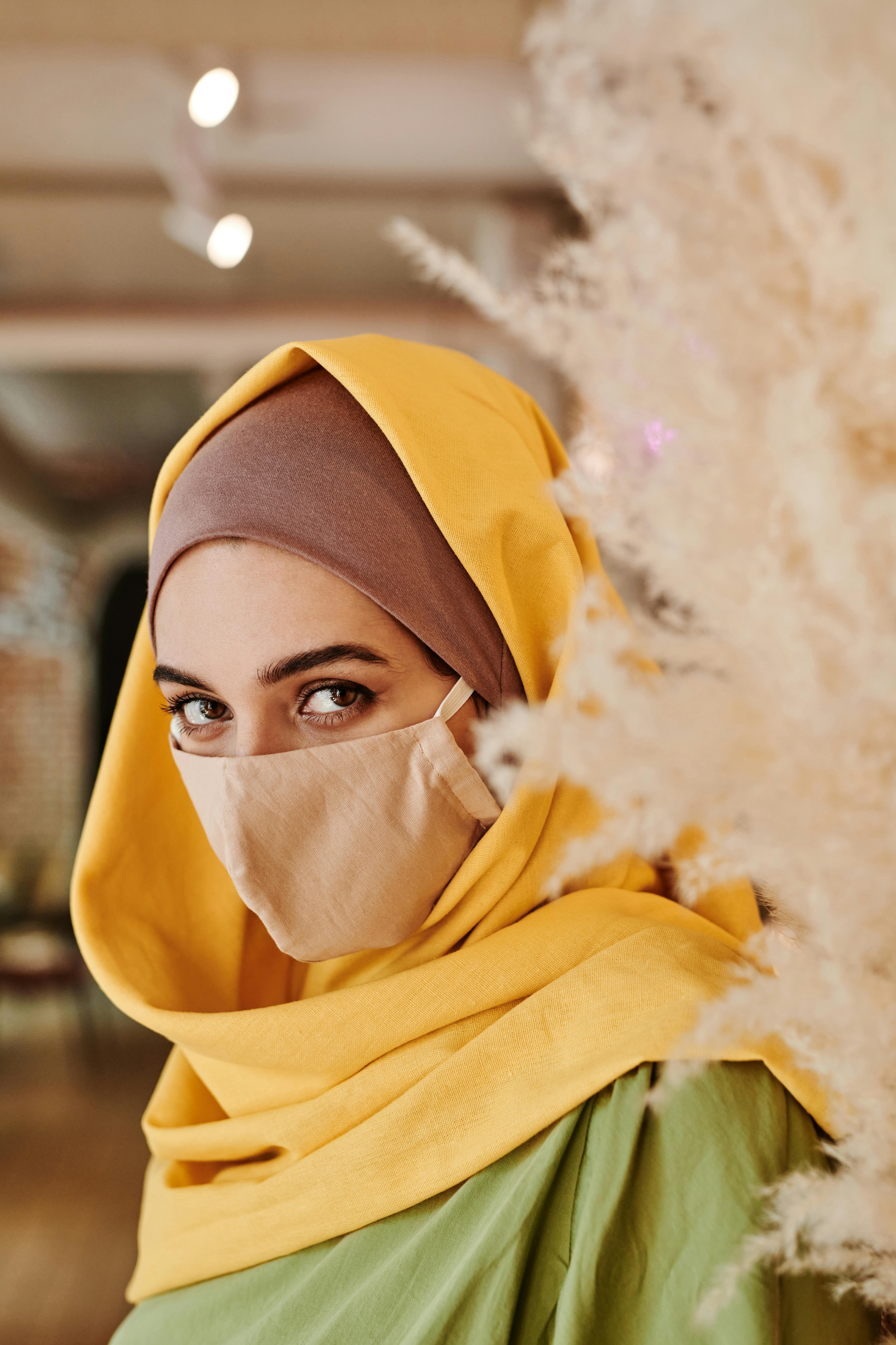 A Woman With a Hijab and a Face Mask · Free Stock Photo