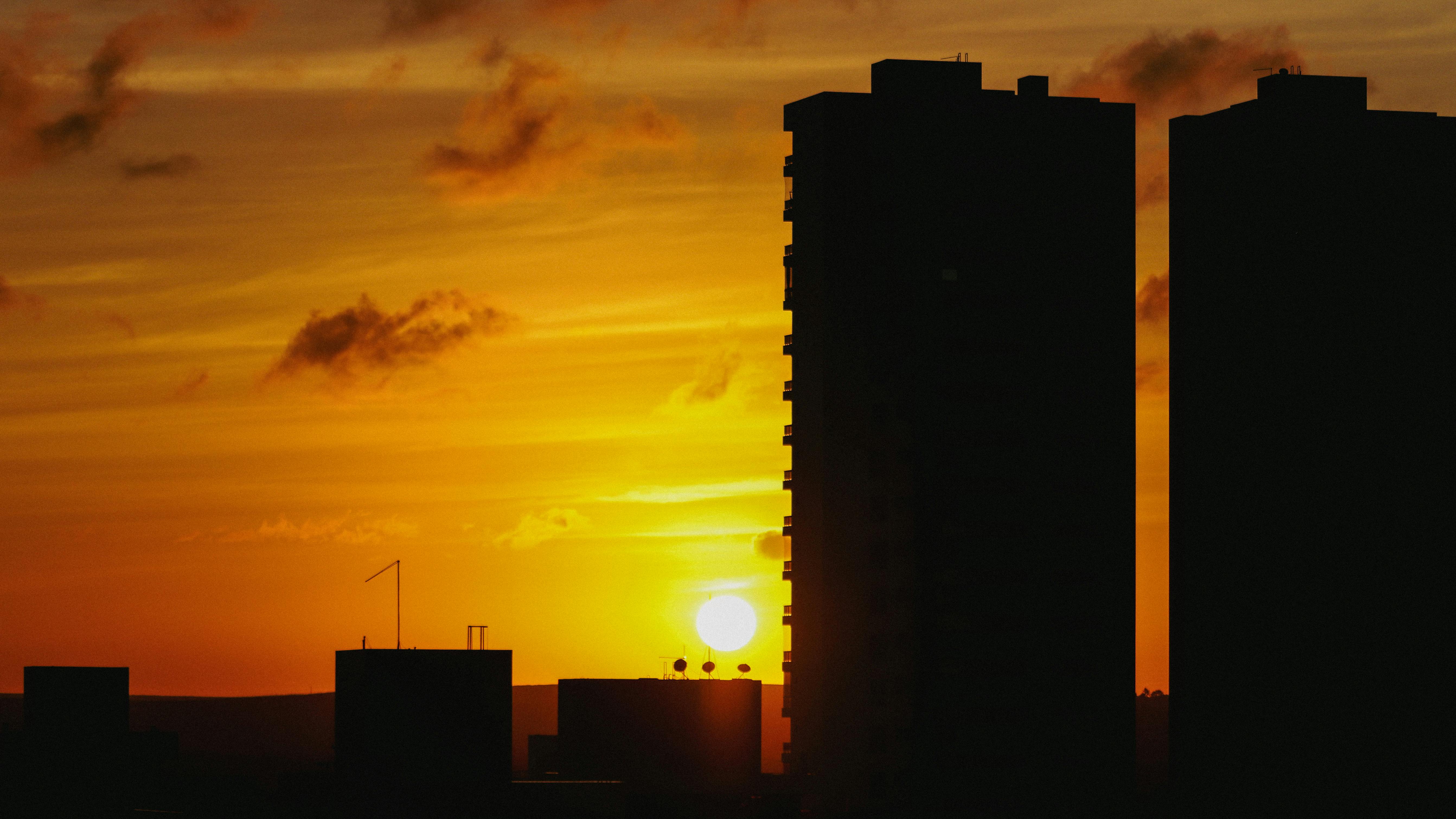 Silhouette of Building during Sunset · Free Stock Photo