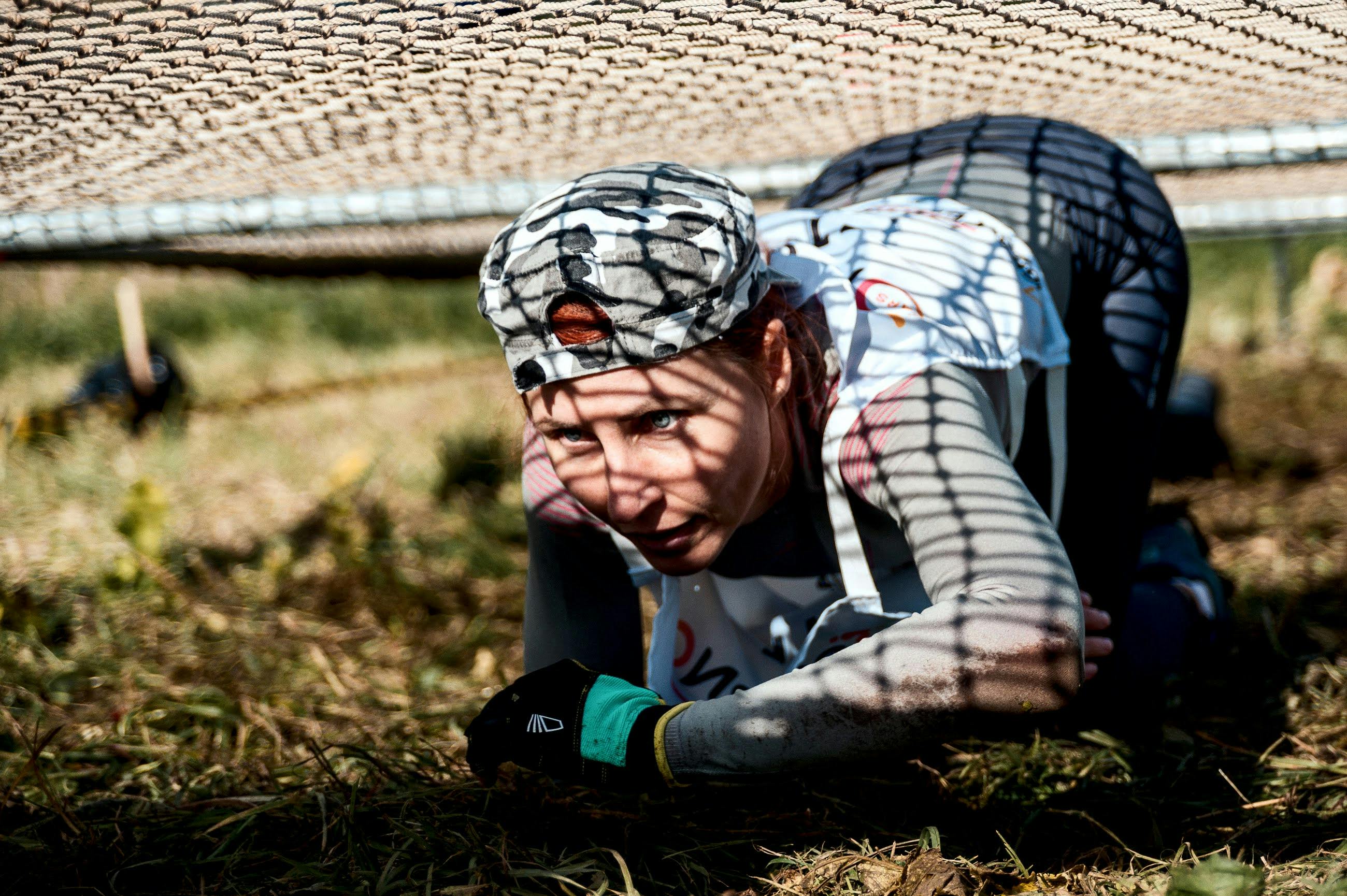 Young Woman Crawling on the Ground · Free Stock Photo