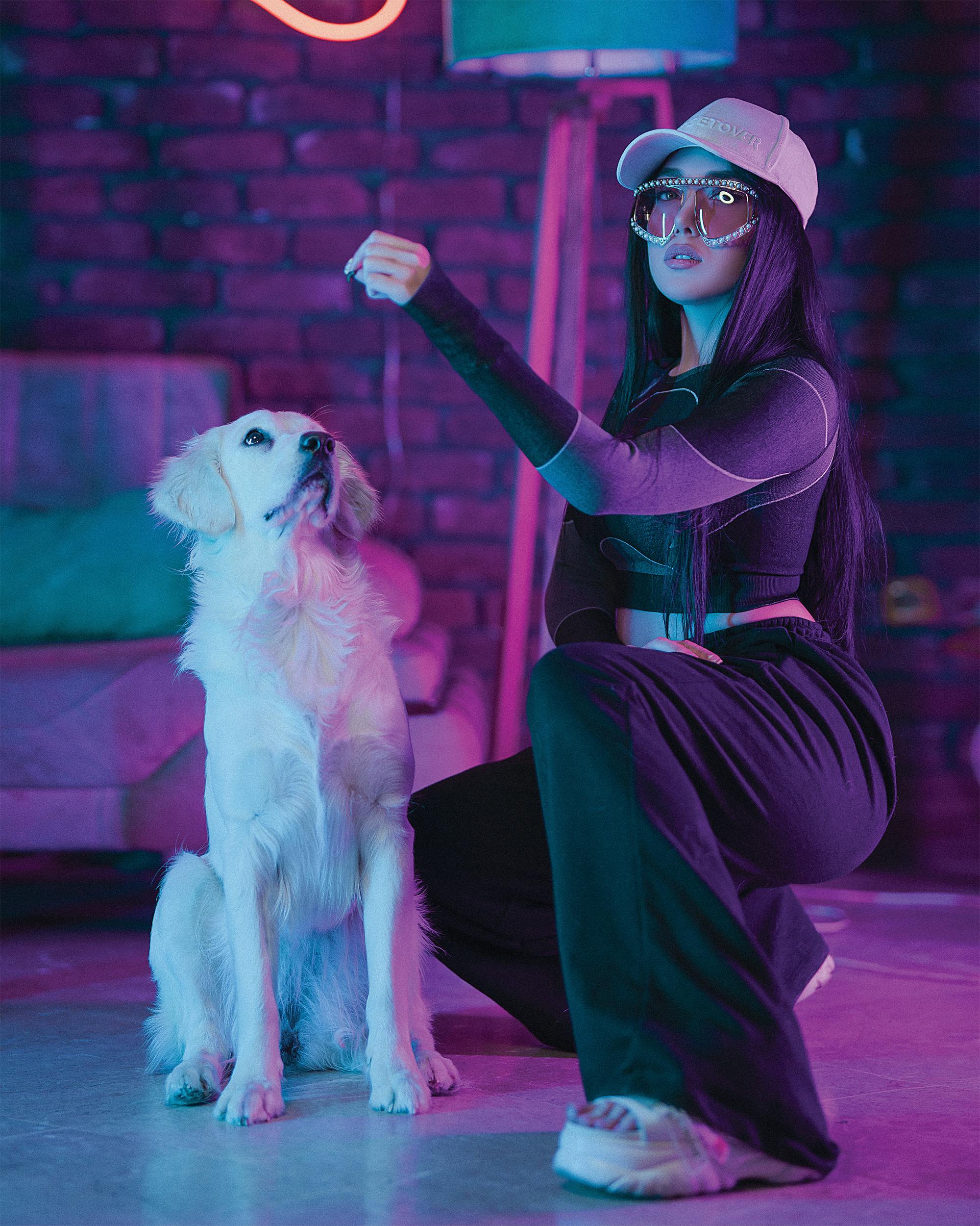 Woman Modeling With Her Dog · Free Stock Photo