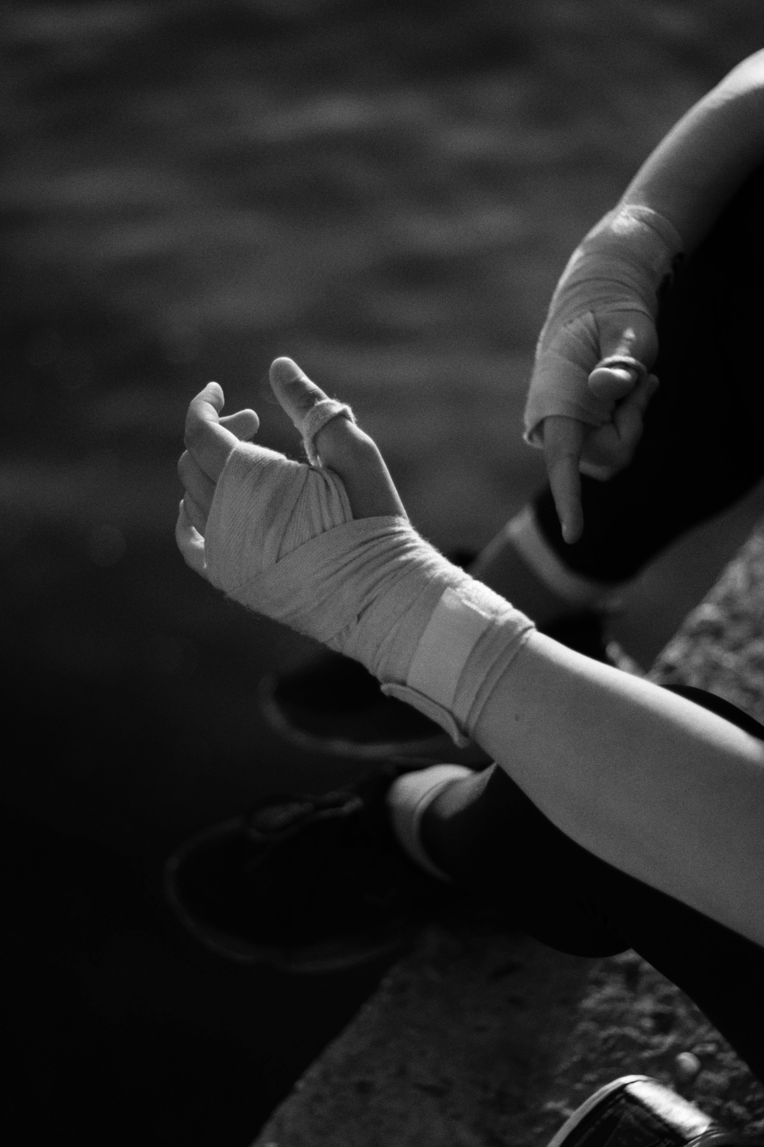 Black and White Photo of Bandaged Hands · Free Stock Photo