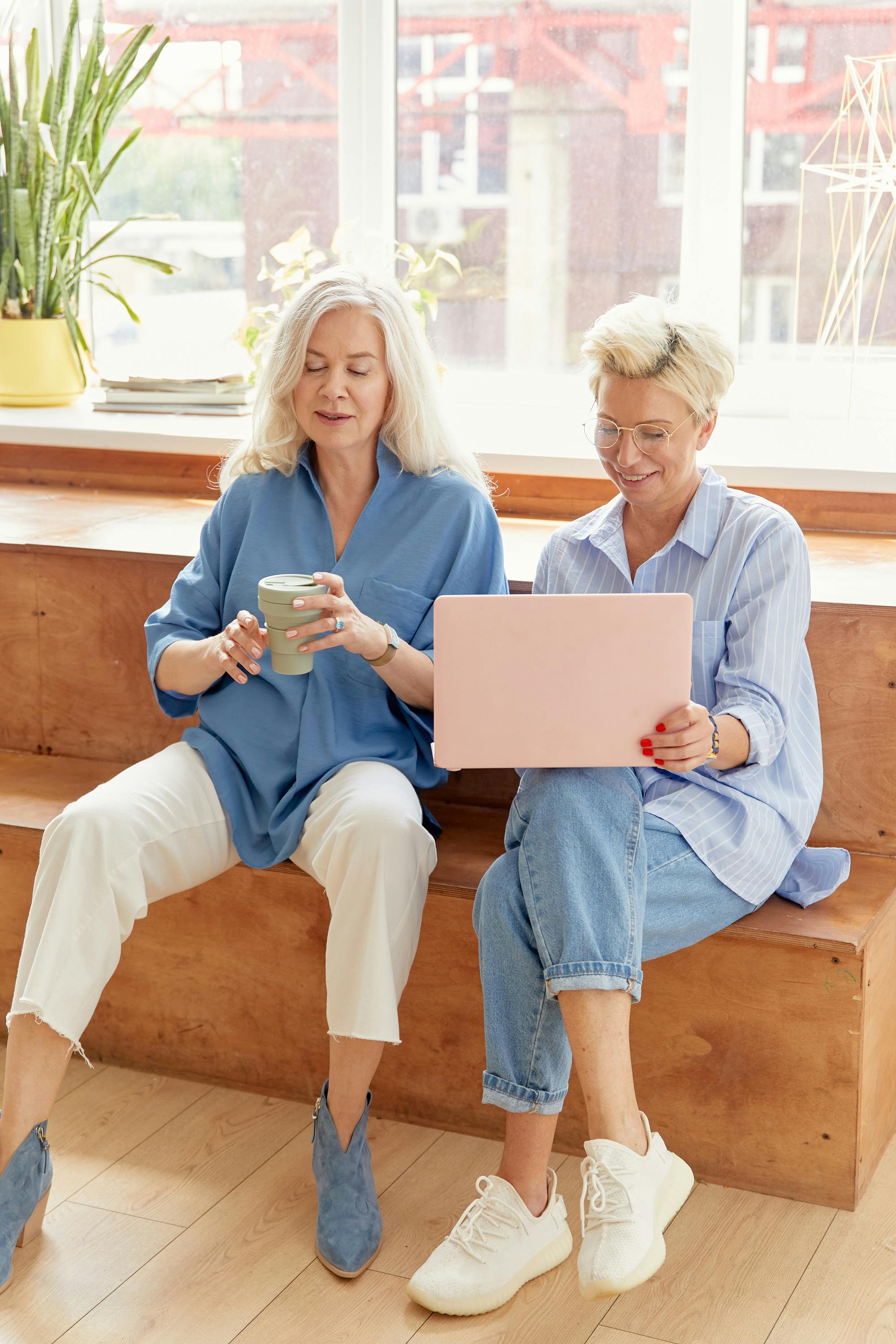 Blonde Women Sitting on Wooden Bench · Free Stock Photo