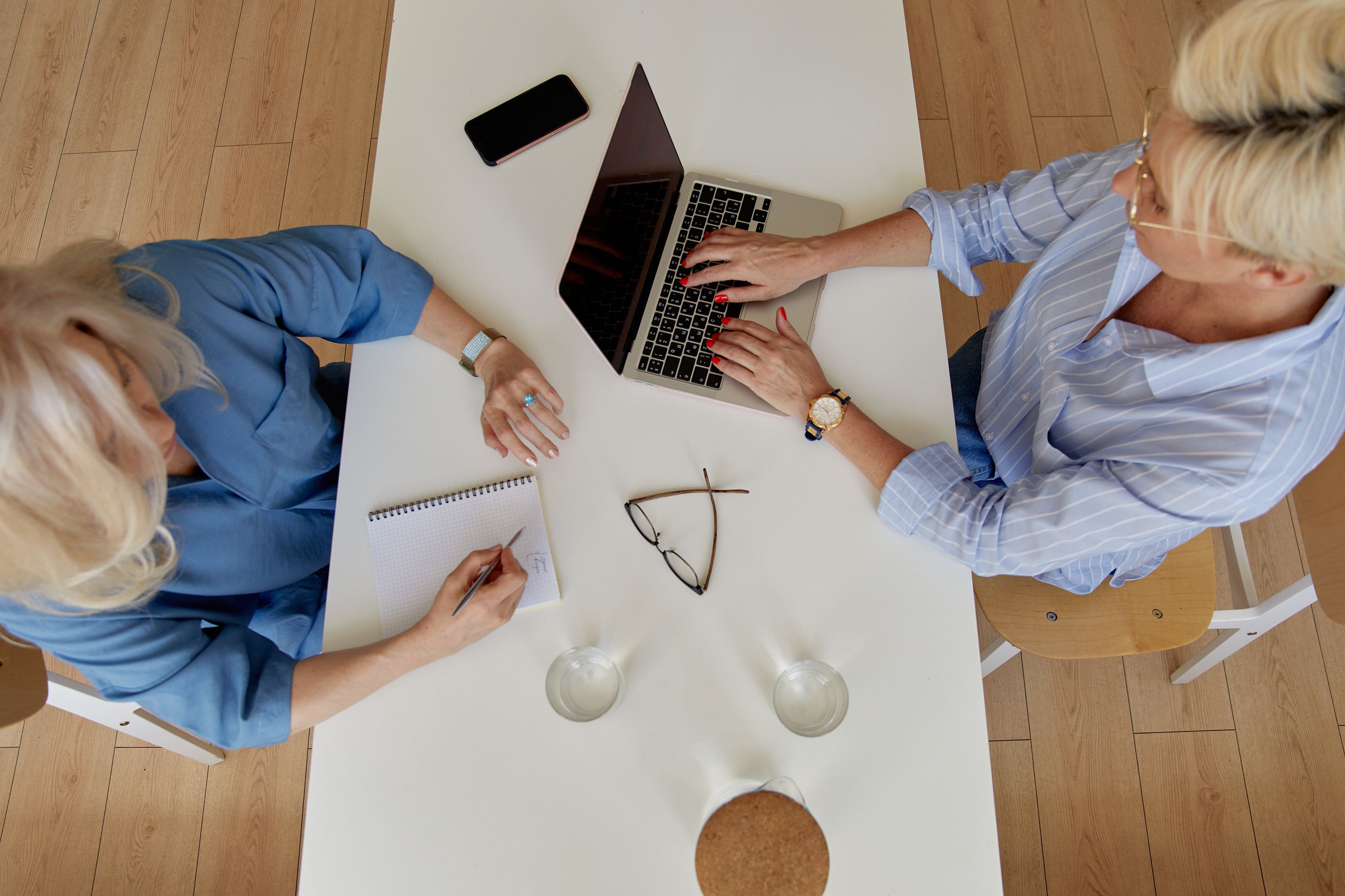 Friends Working Opposite Each Other · Free Stock Photo