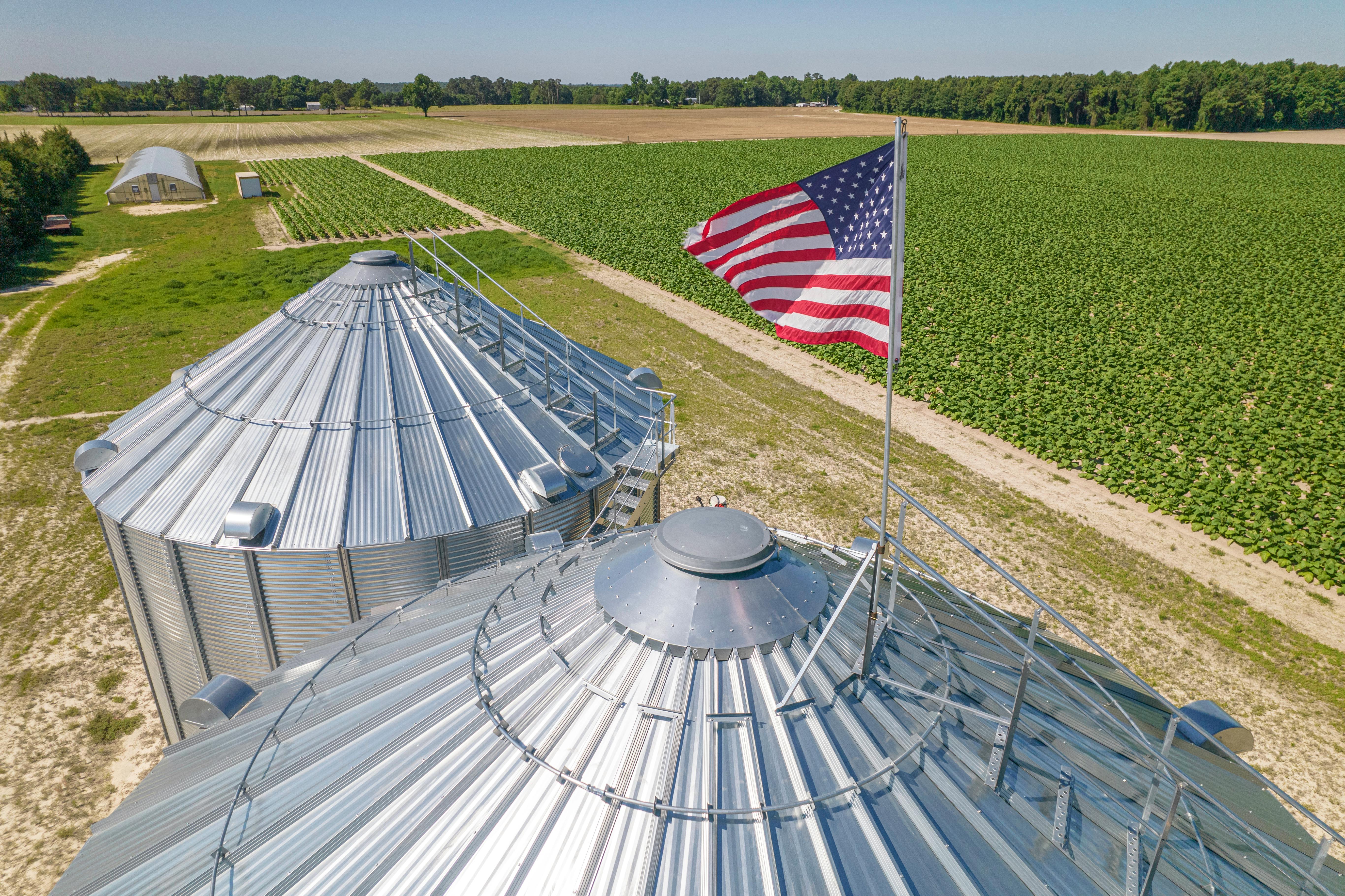 Steel Containers on a Farmland · Free Stock Photo