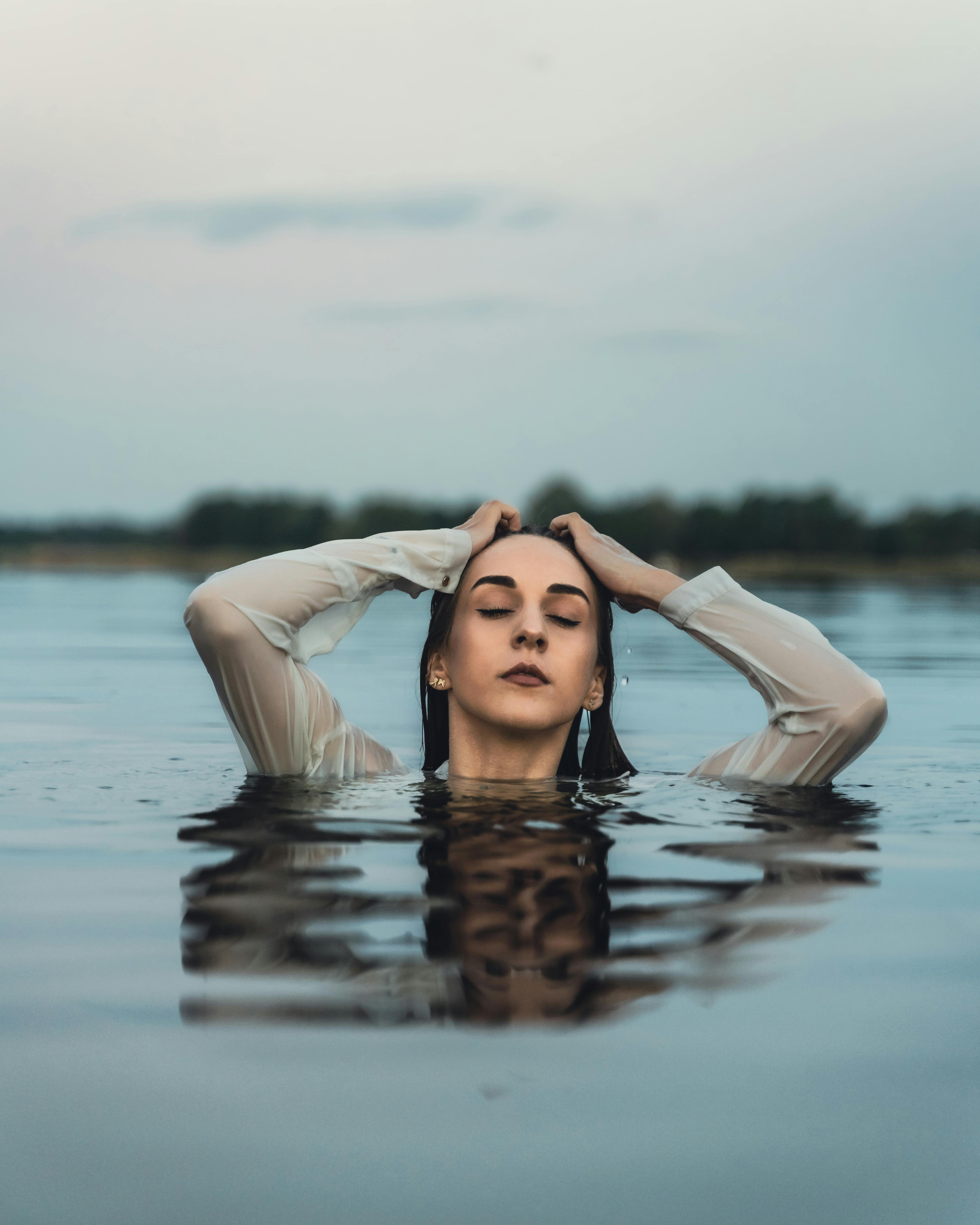 Girl Emerging from the Water · Free Stock Photo