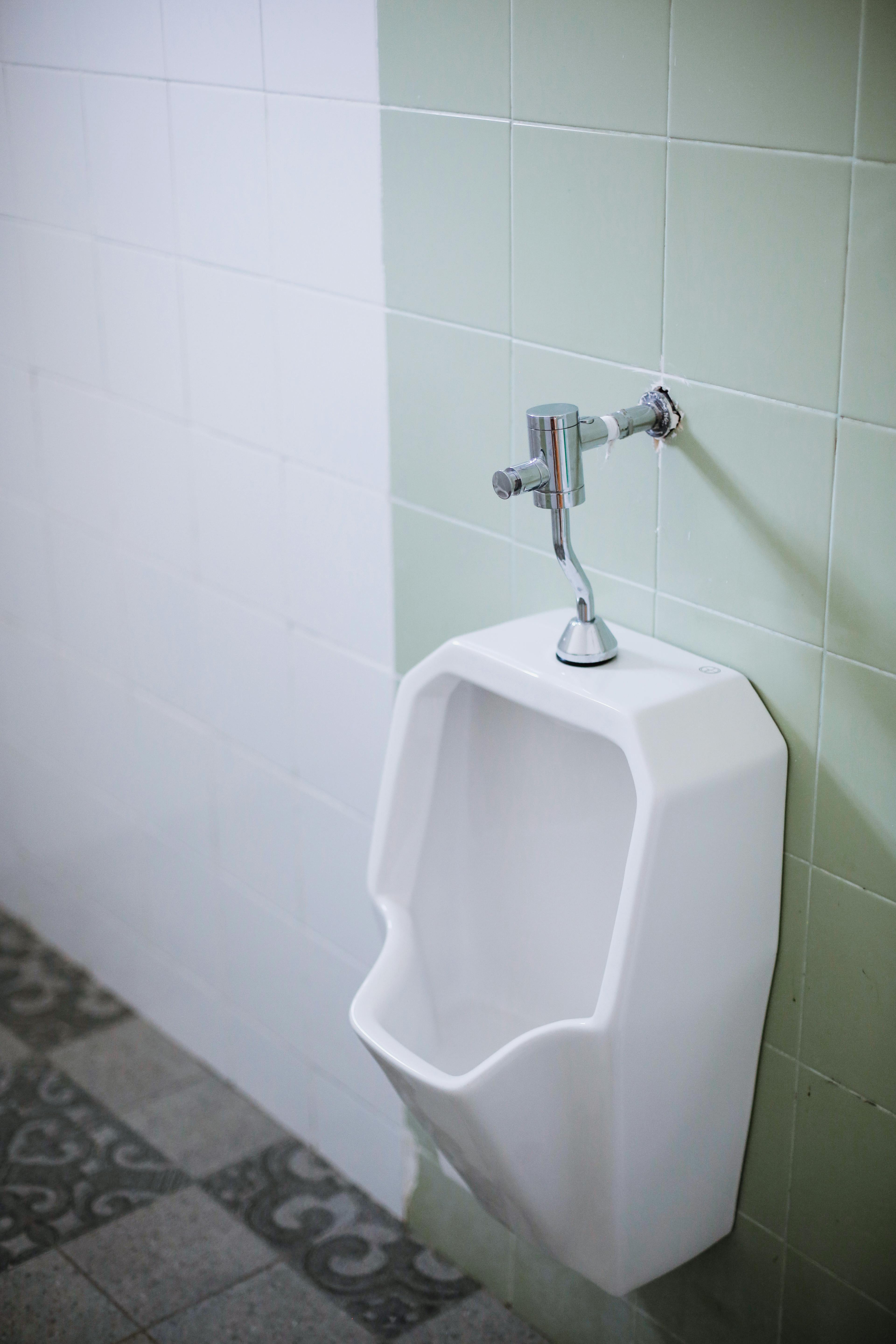 Photograph of a Restroom with Urinals · Free Stock Photo