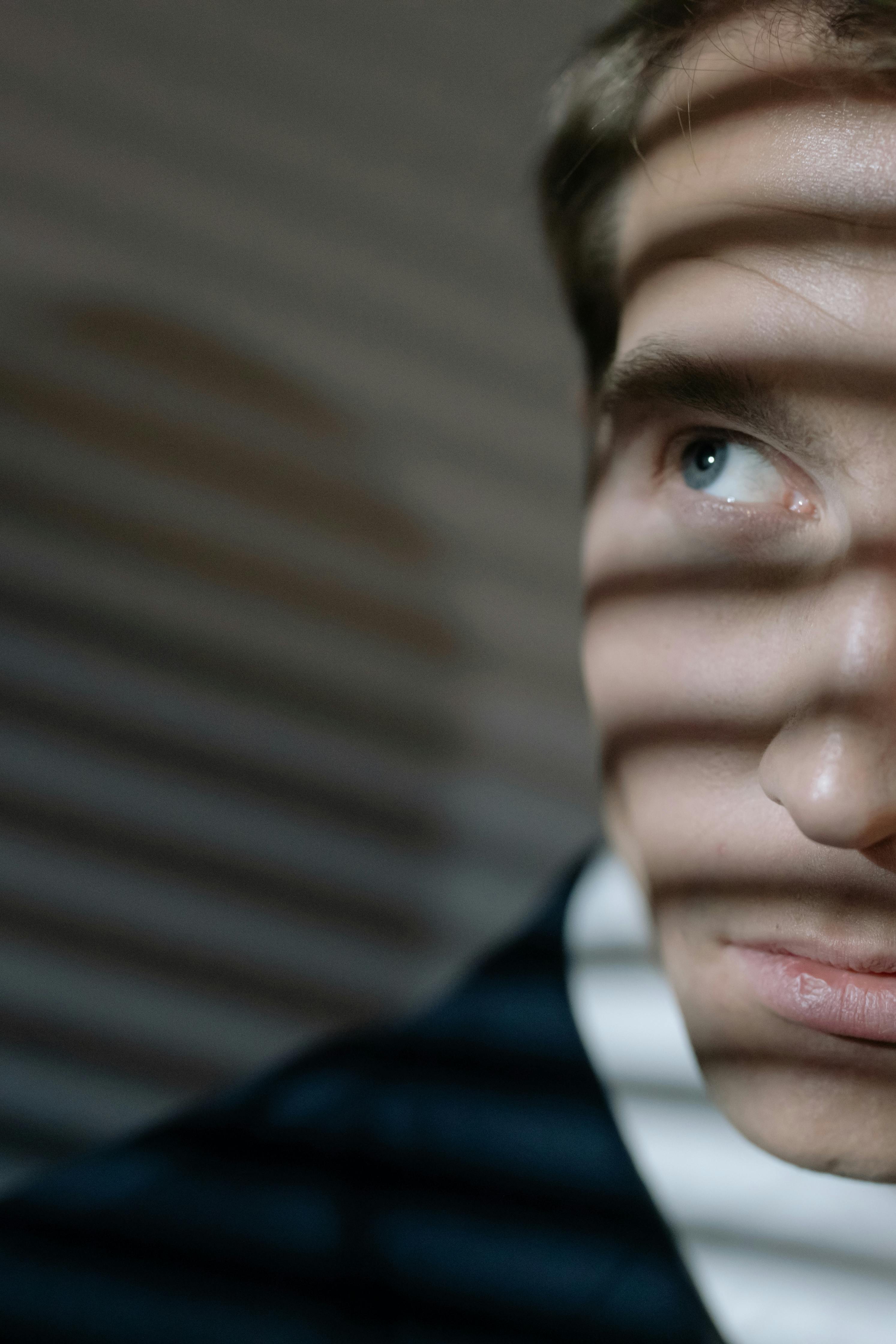 Man Looking Through Window · Free Stock Photo