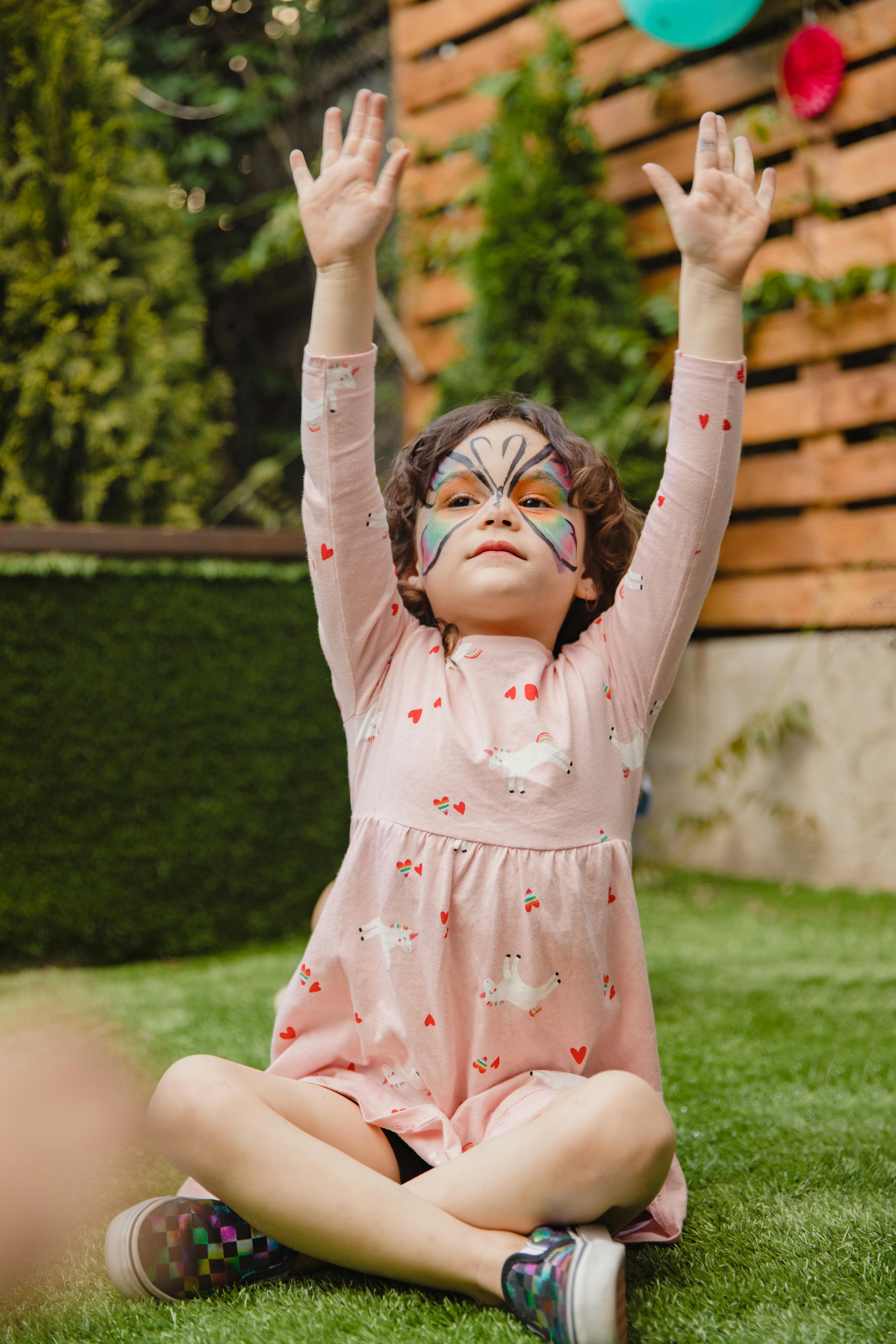Little Girl Raising Her Hands · Free Stock Photo