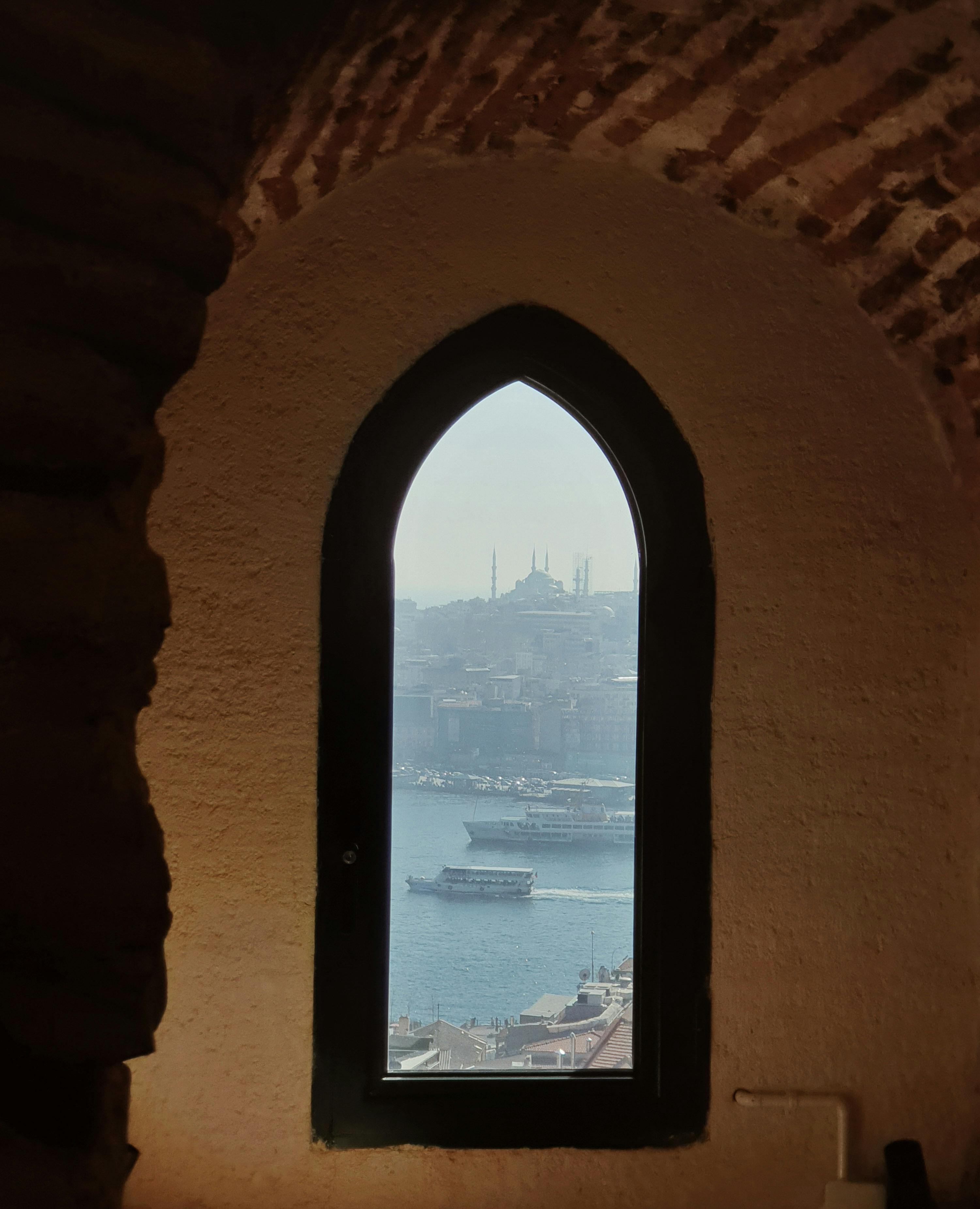 Dome of a Mosque Seen trough Windows with Turkey Flag · Free Stock Photo