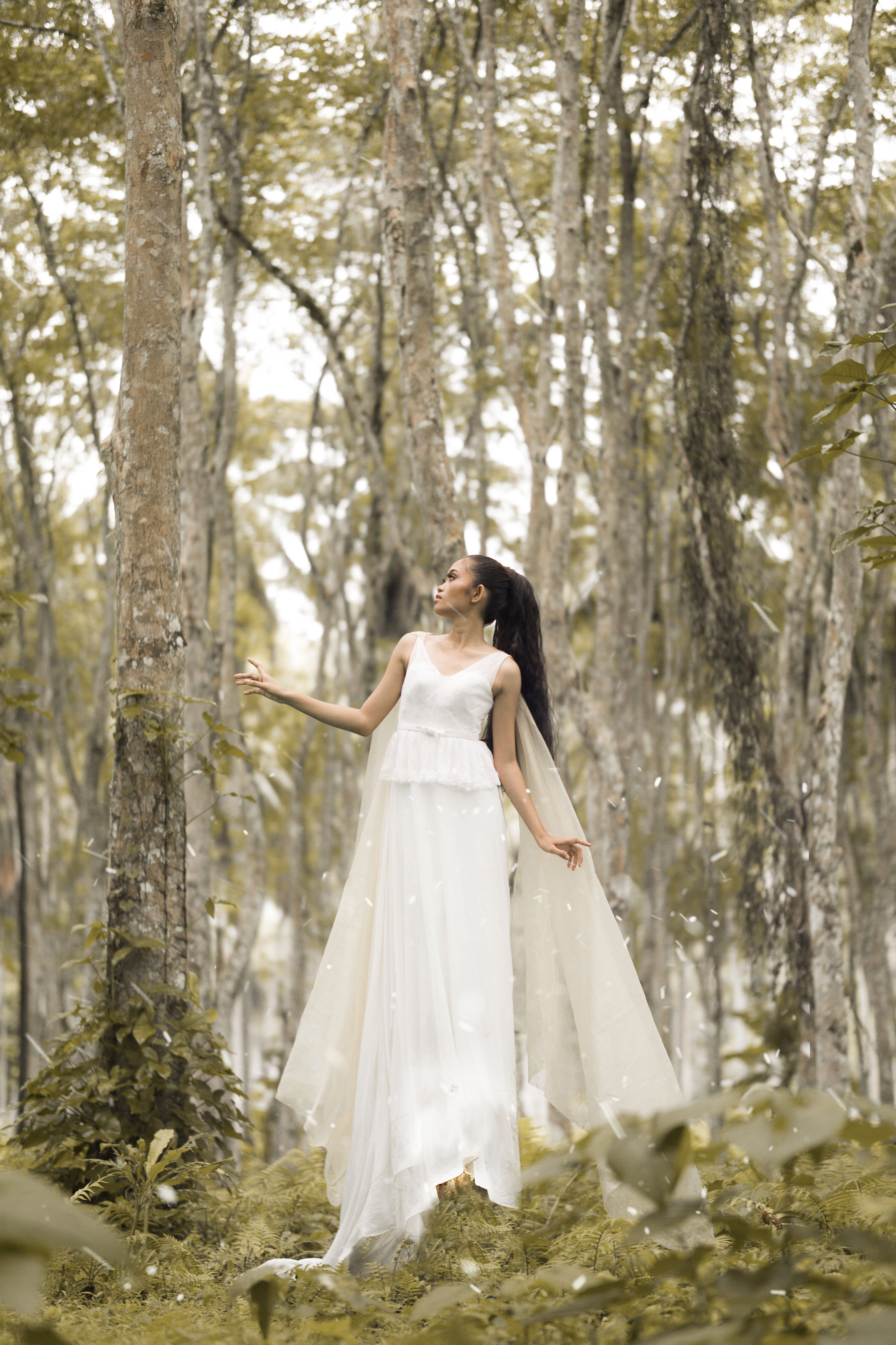 A Woman Wearing White Dress in the Forest · Free Stock Photo