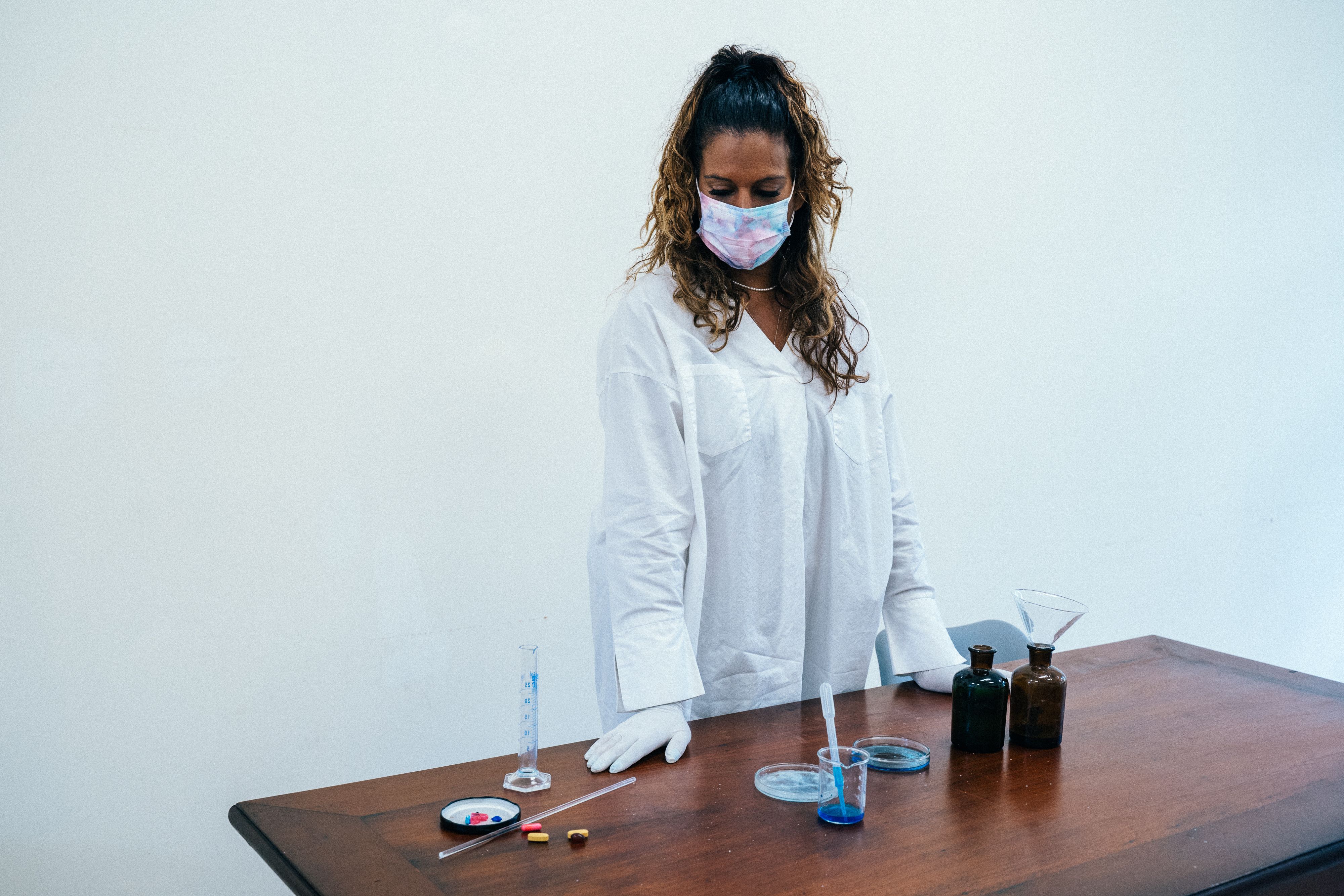 A Woman Experimenting in the Lab · Free Stock Photo