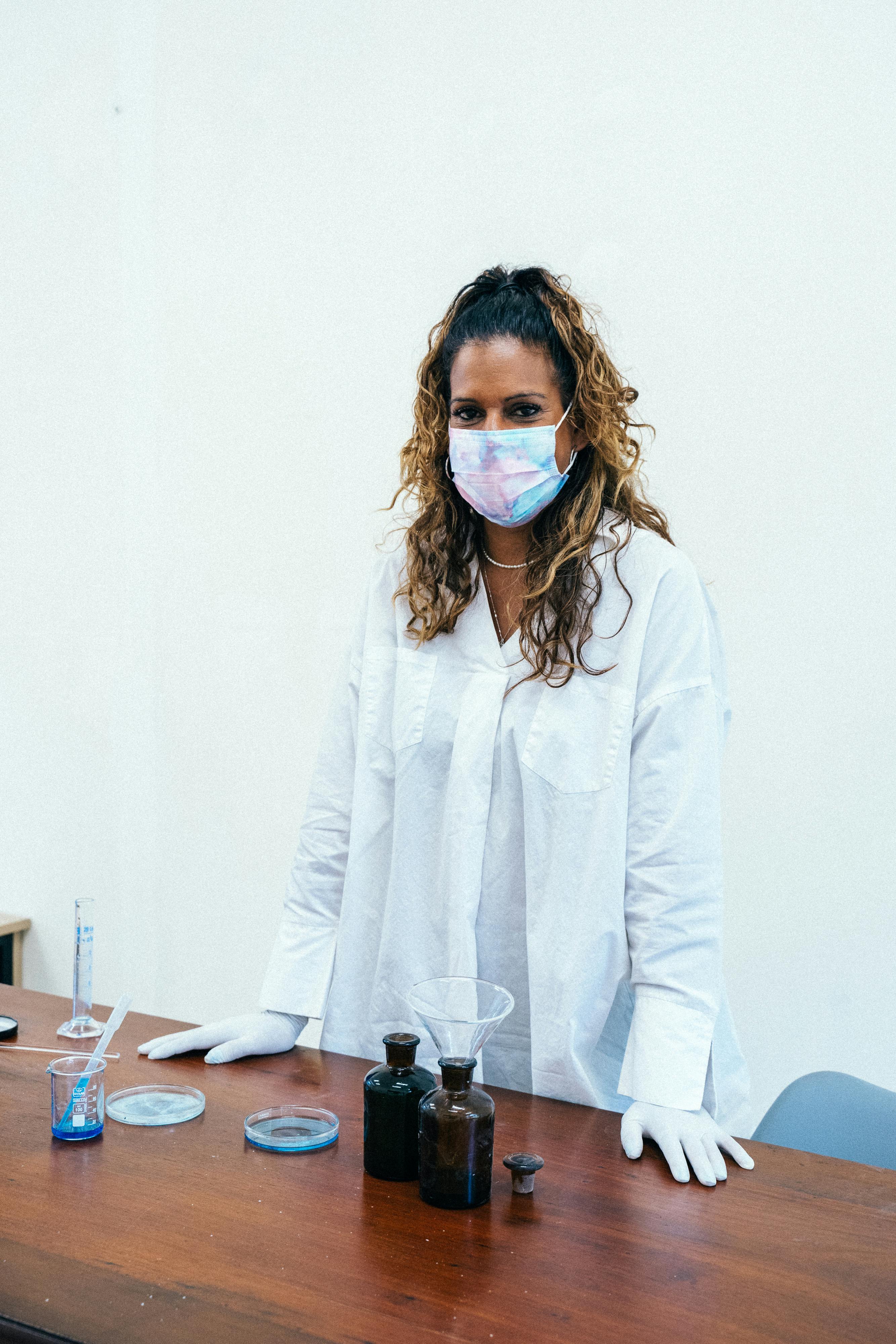 A Woman Experimenting in the Lab · Free Stock Photo