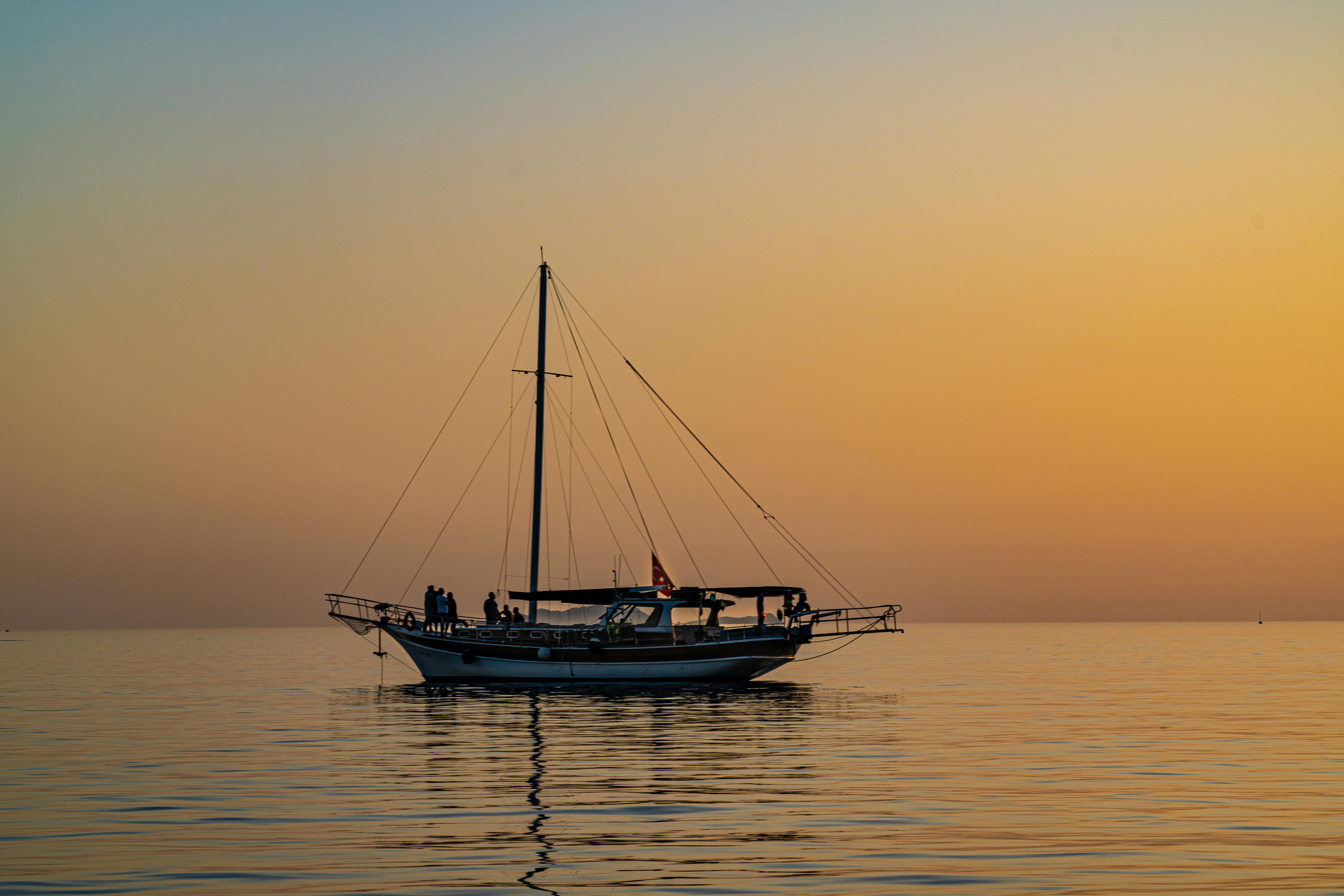 Sailboat Anchored on Sea · Free Stock Photo