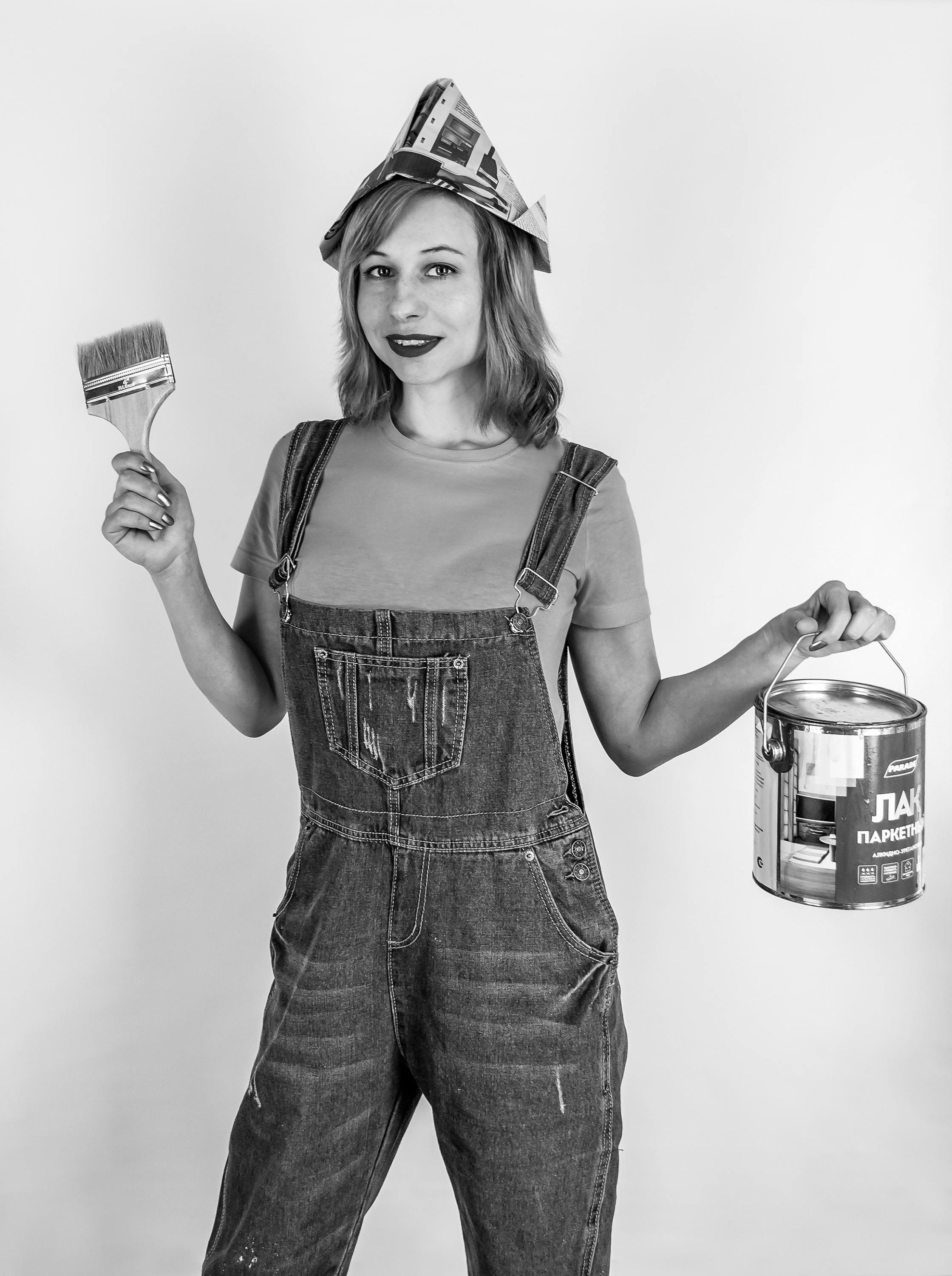 Woman Painting on a Wall · Free Stock Photo