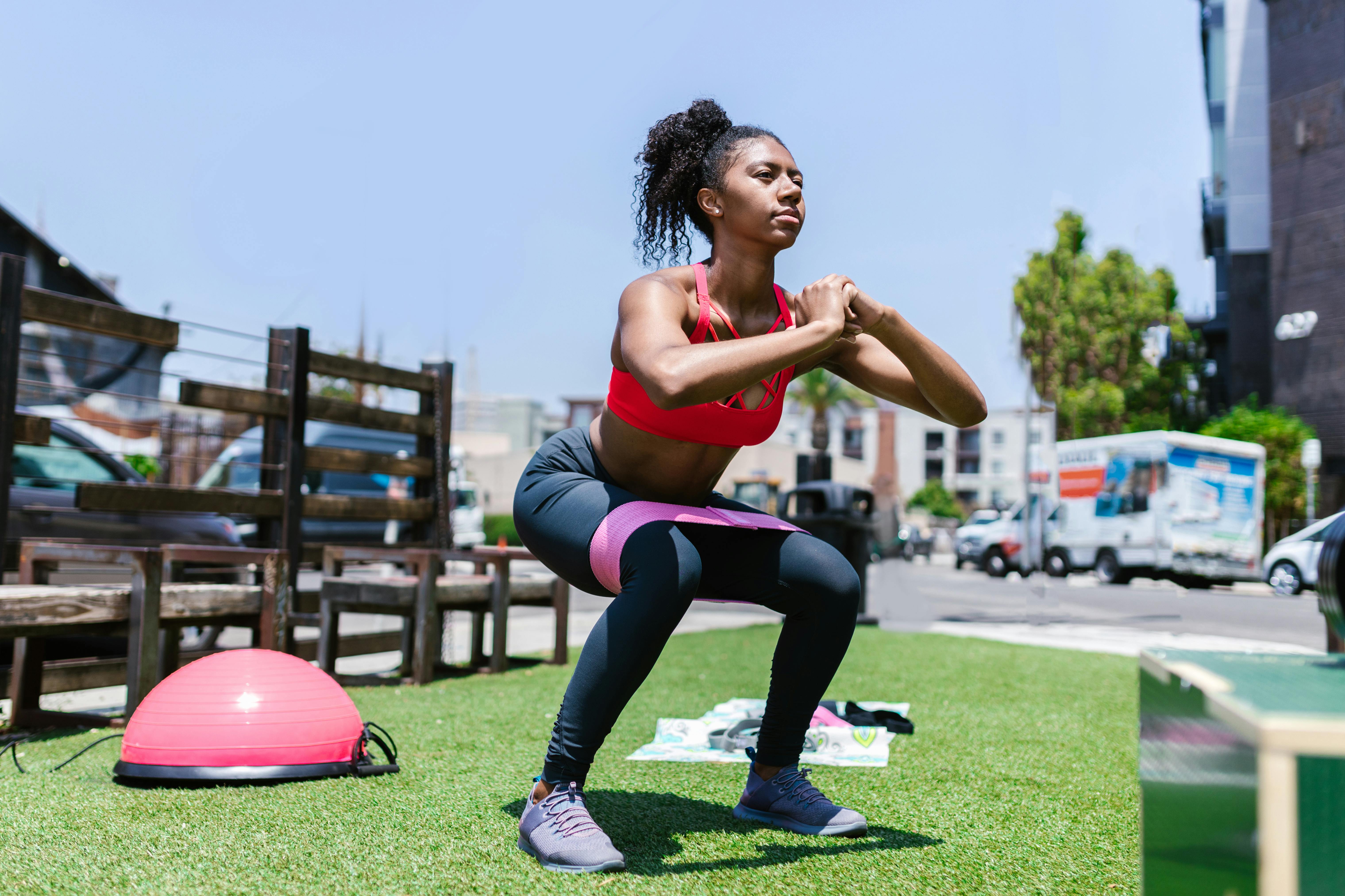 Man and Woman Exercising Together on Concrete Floor · Free Stock Photo