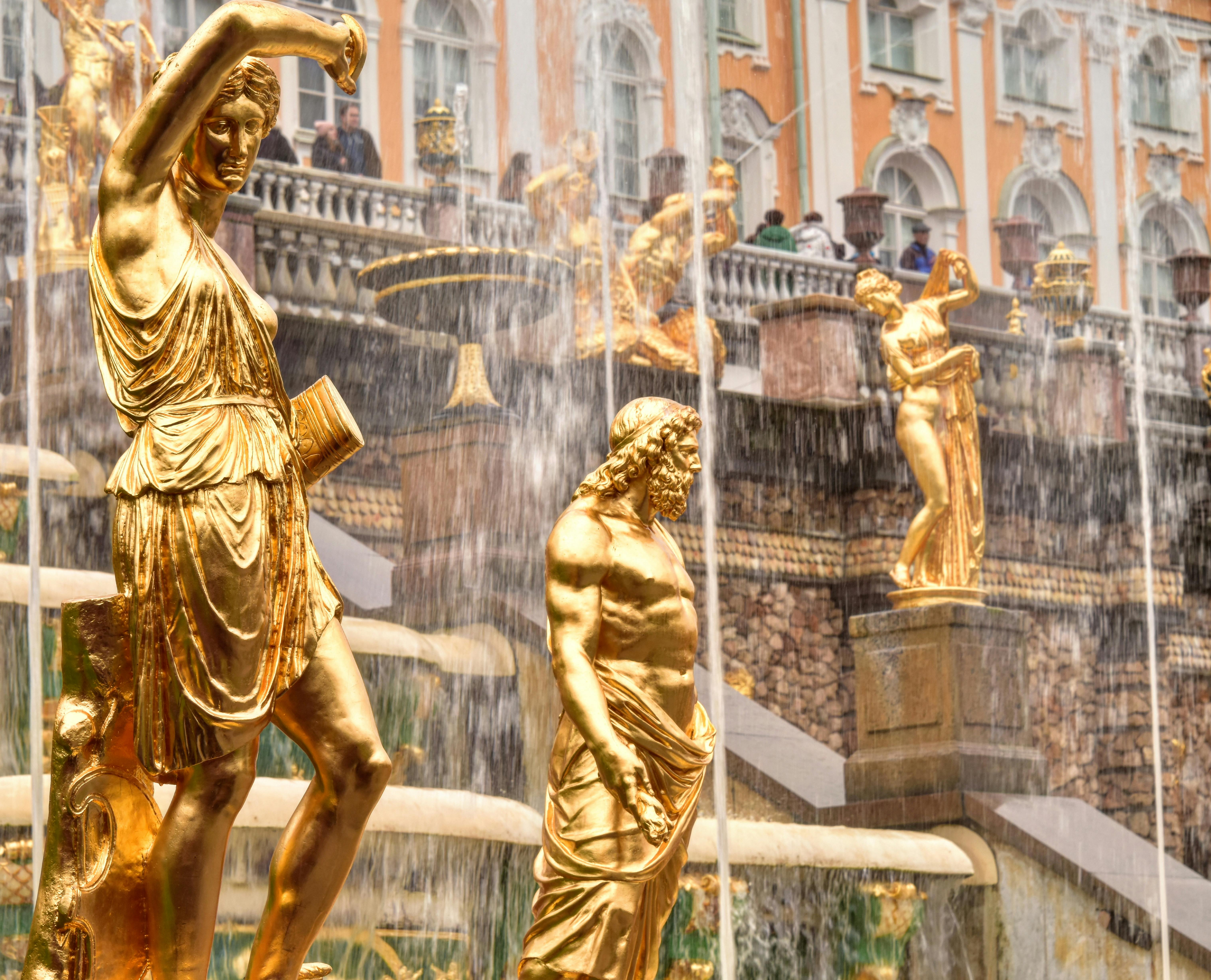 Gold Statues in a Fountain and Building Facade · Free Stock Photo
