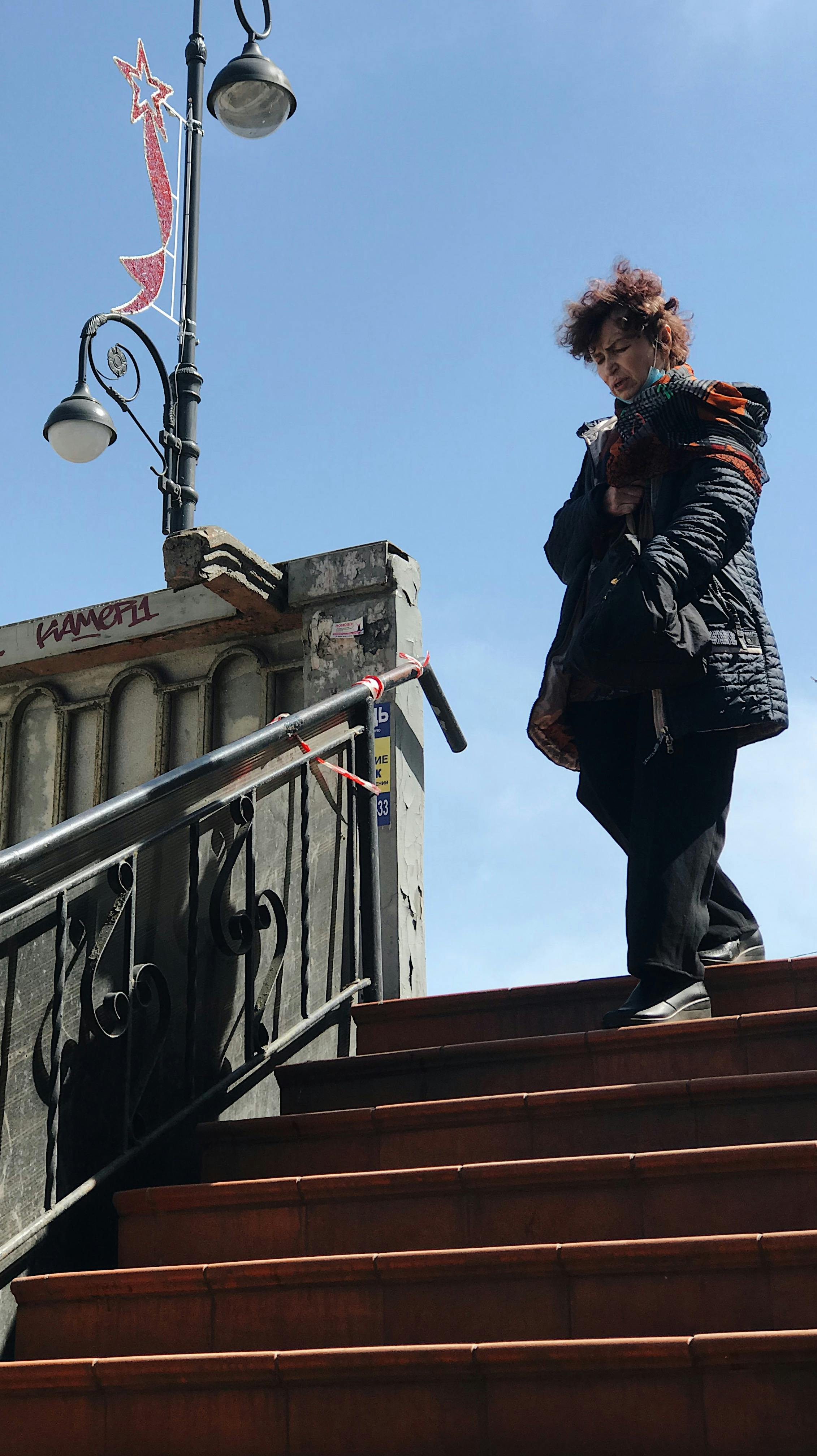 A Person Walking Up Stairs · Free Stock Photo