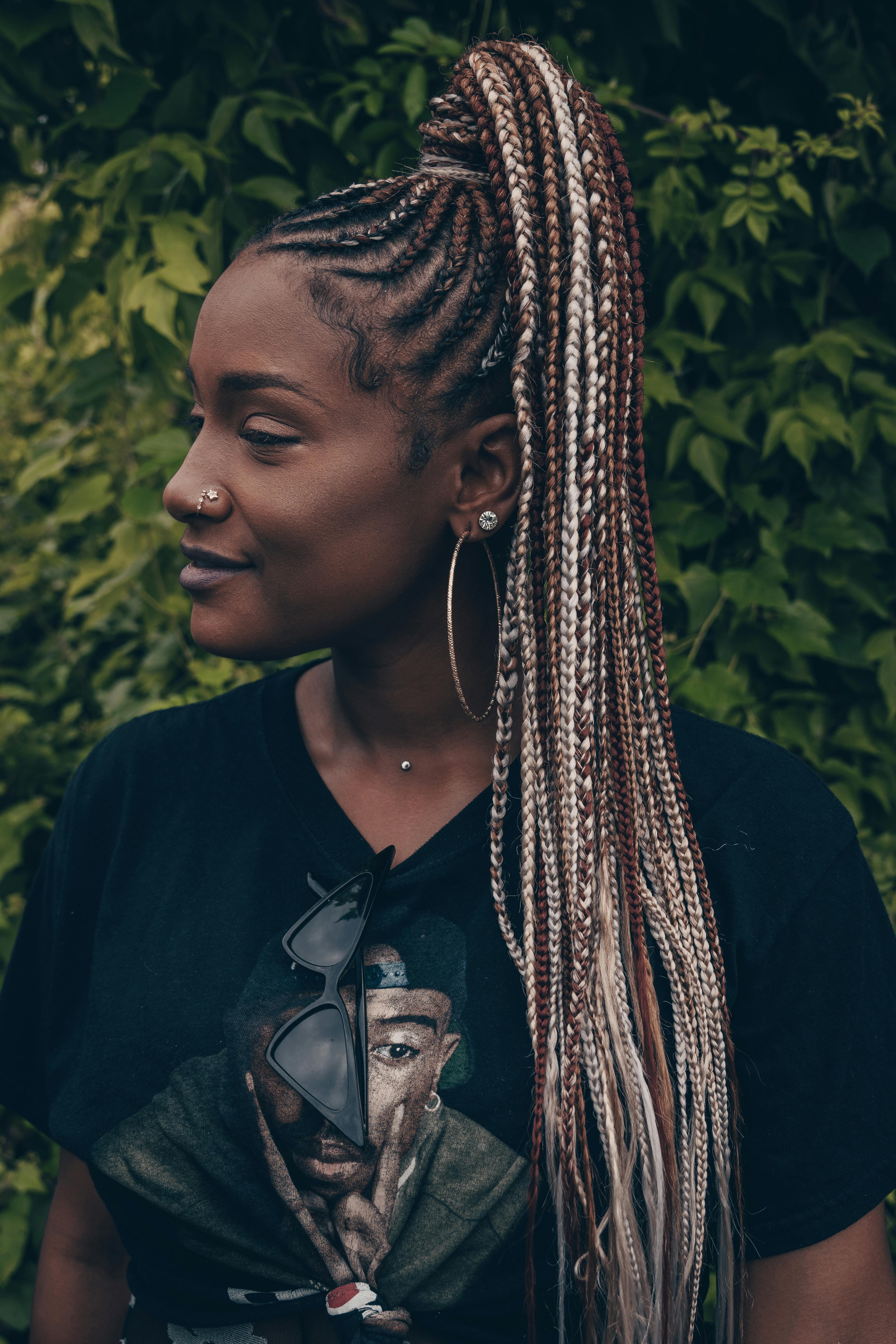 Photograph of a Woman with Braids Wearing a Black Shirt · Free Stock Photo