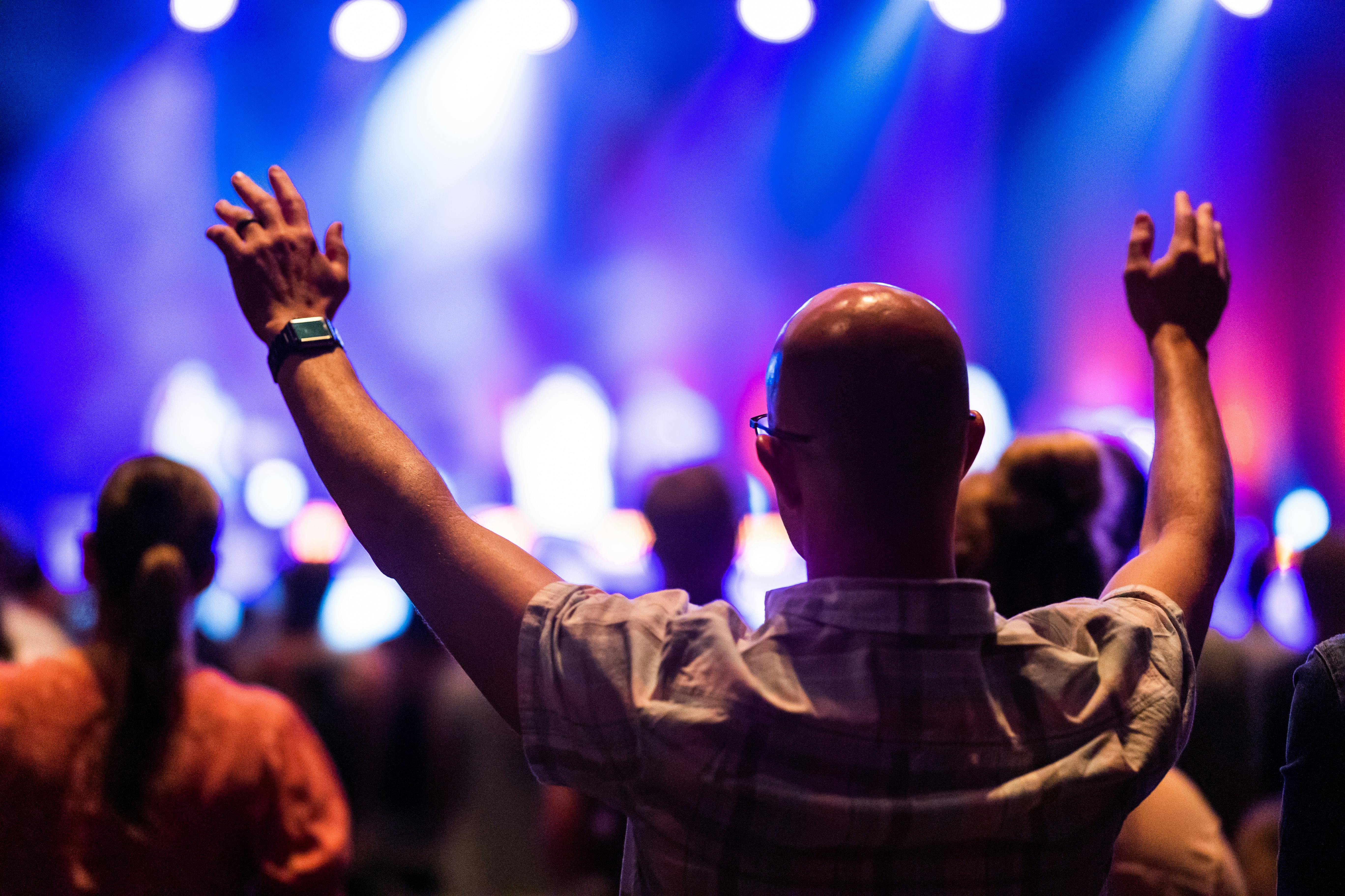 A Man with His Hands Up · Free Stock Photo