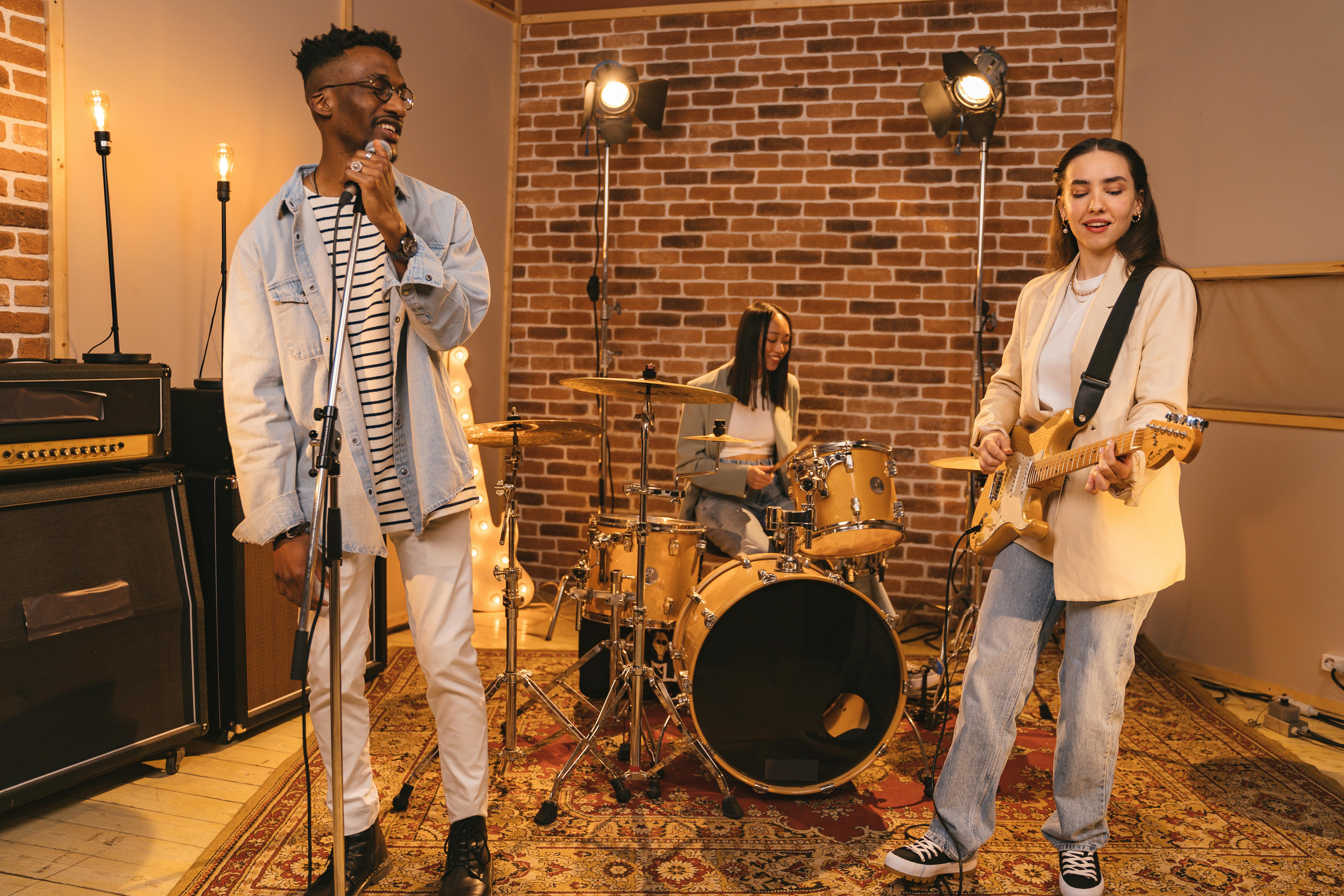 Band Performing in Record Studio · Free Stock Photo