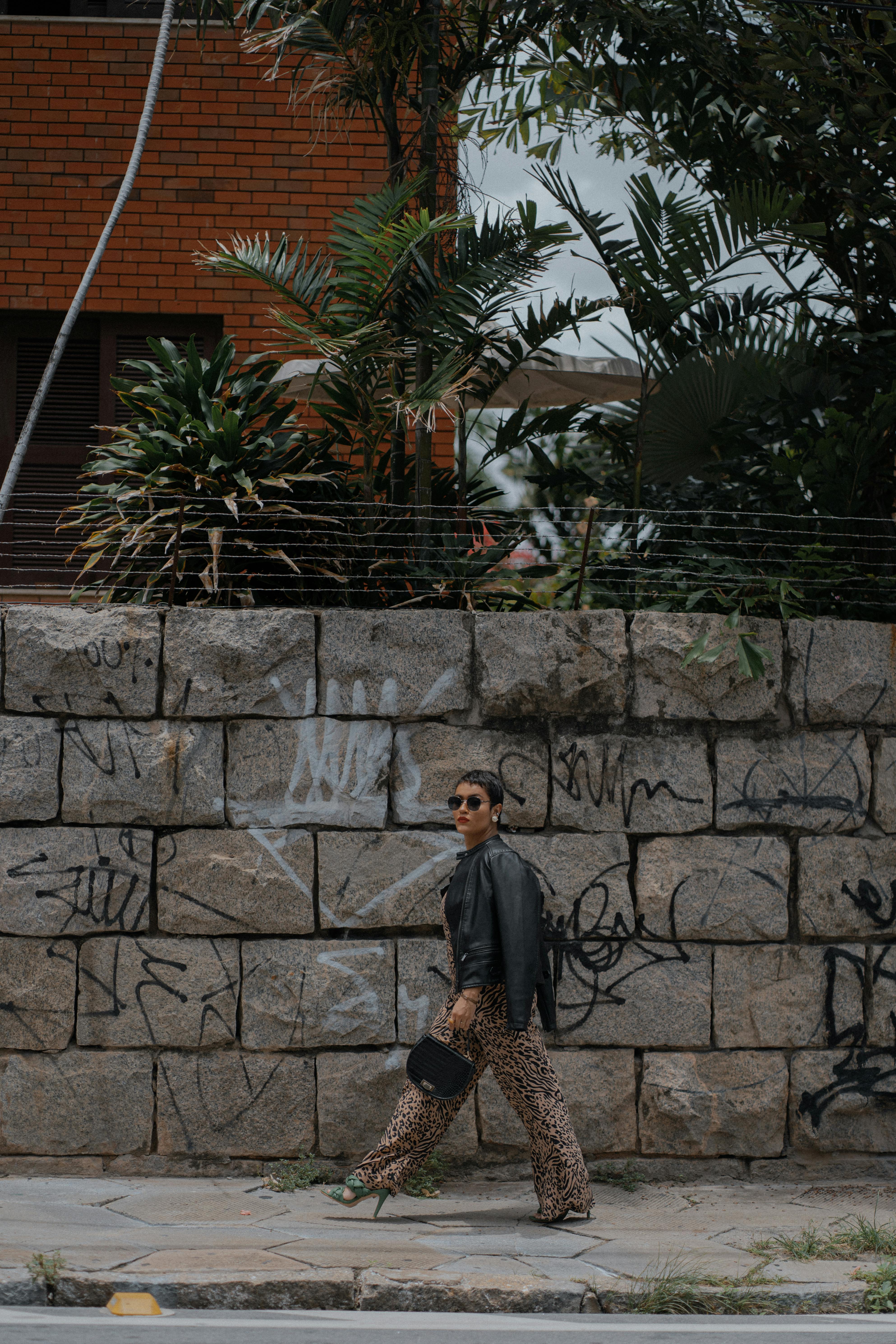 Woman Walking on the Sidewalk · Free Stock Photo
