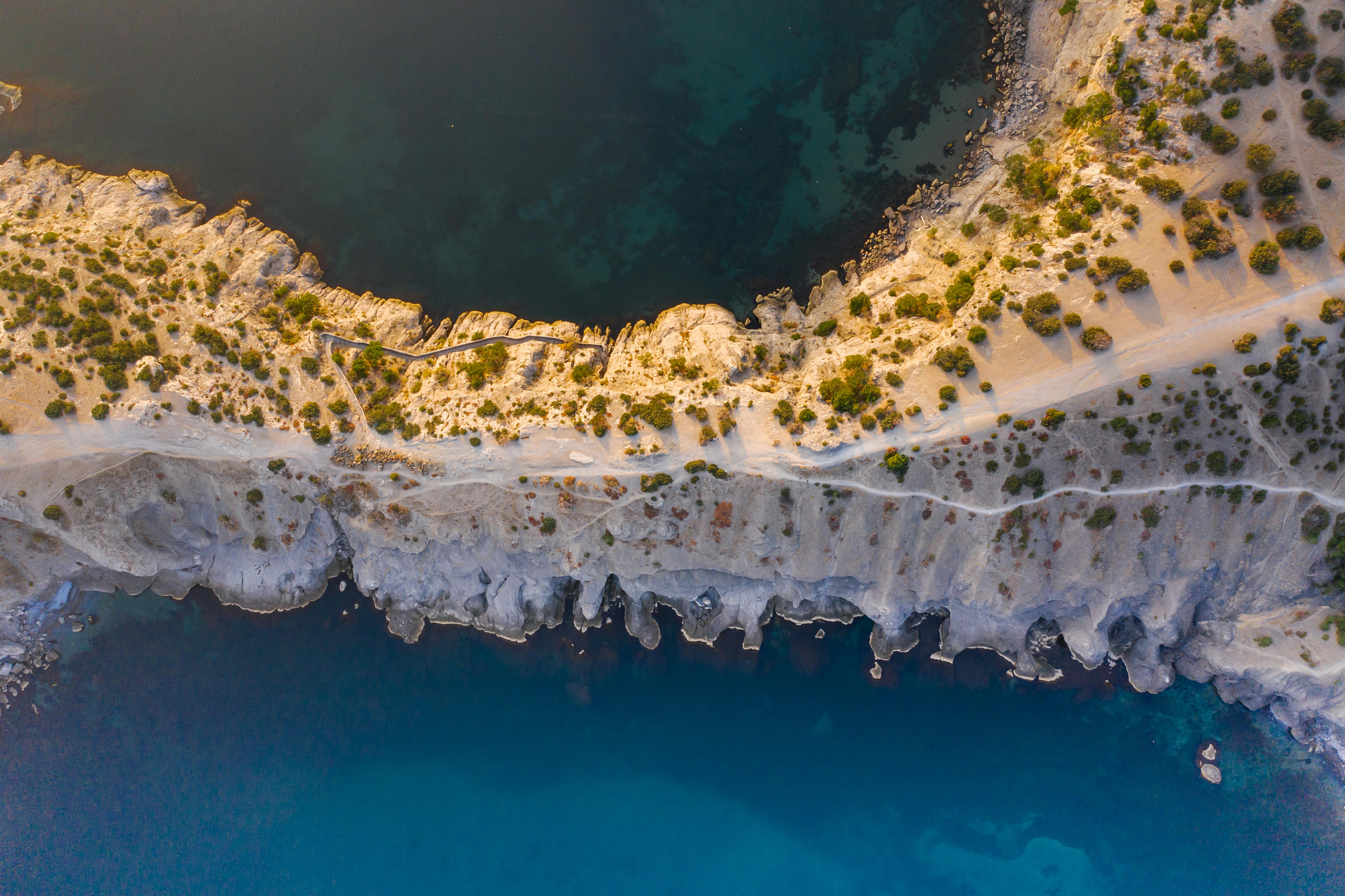 An Aerial Photography of a Rock Formation Near the Ocean · Free Stock Photo