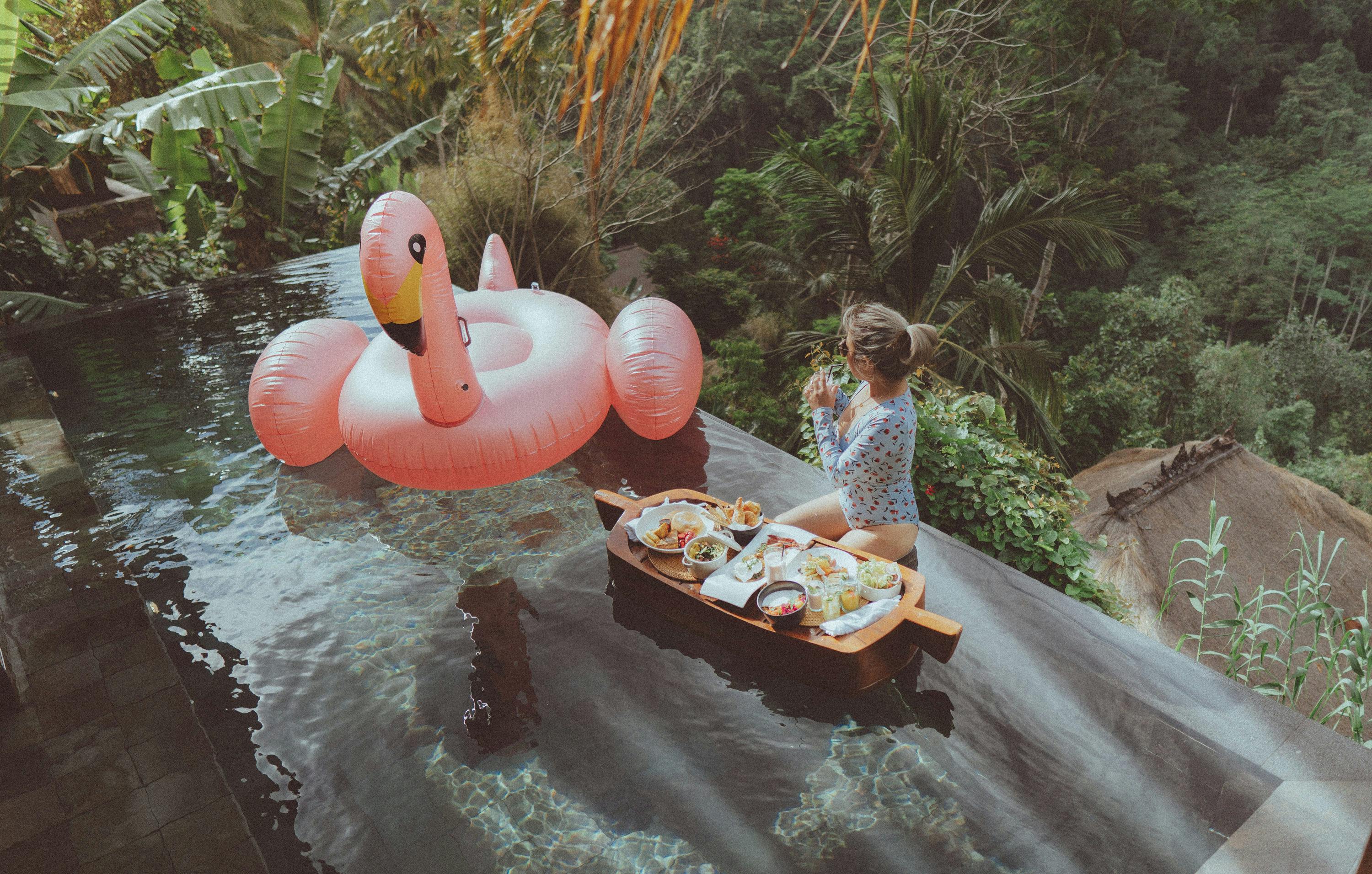 Inflatable Floaters in a Swimming Pool · Free Stock Photo