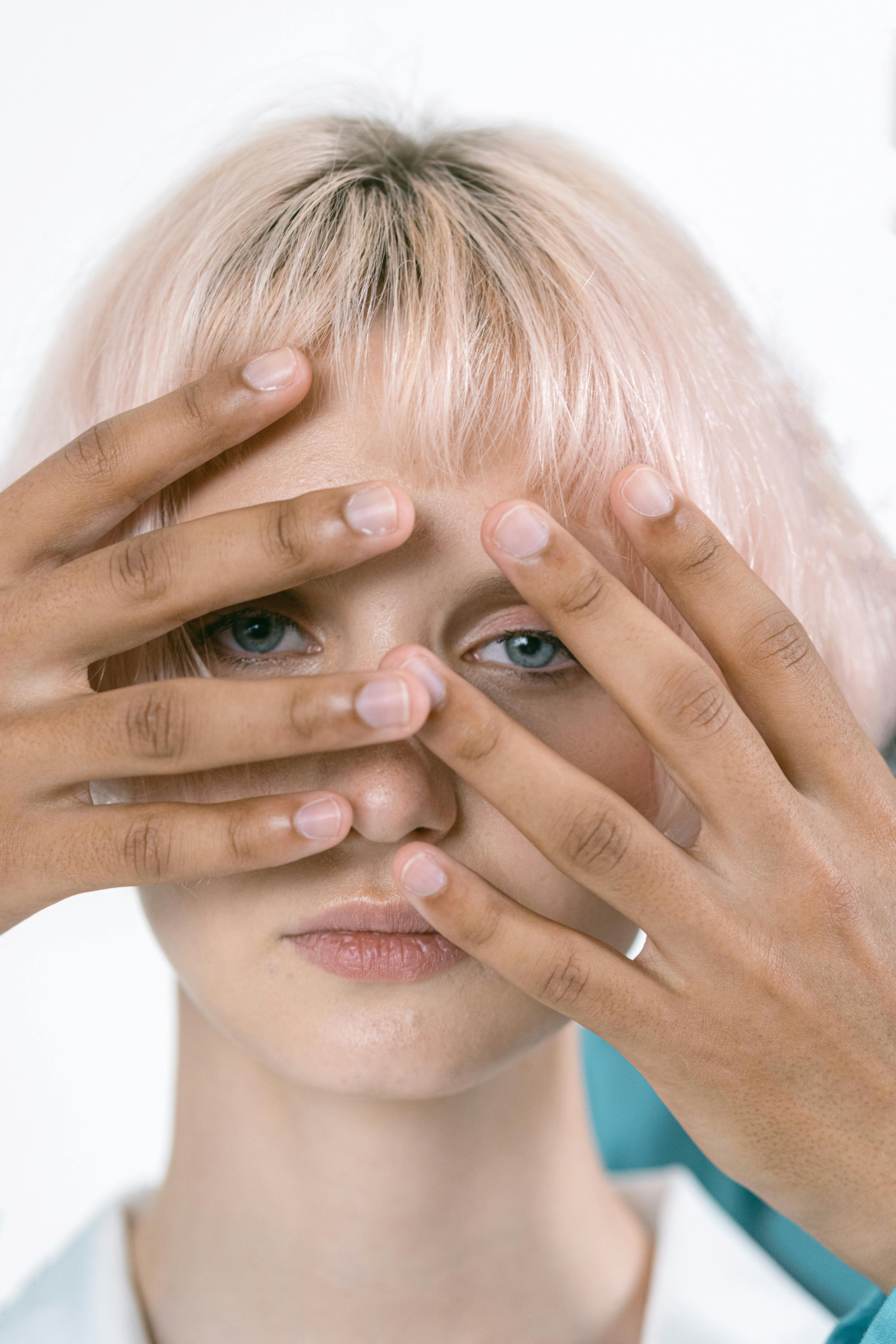Woman With Hands on Her Face · Free Stock Photo