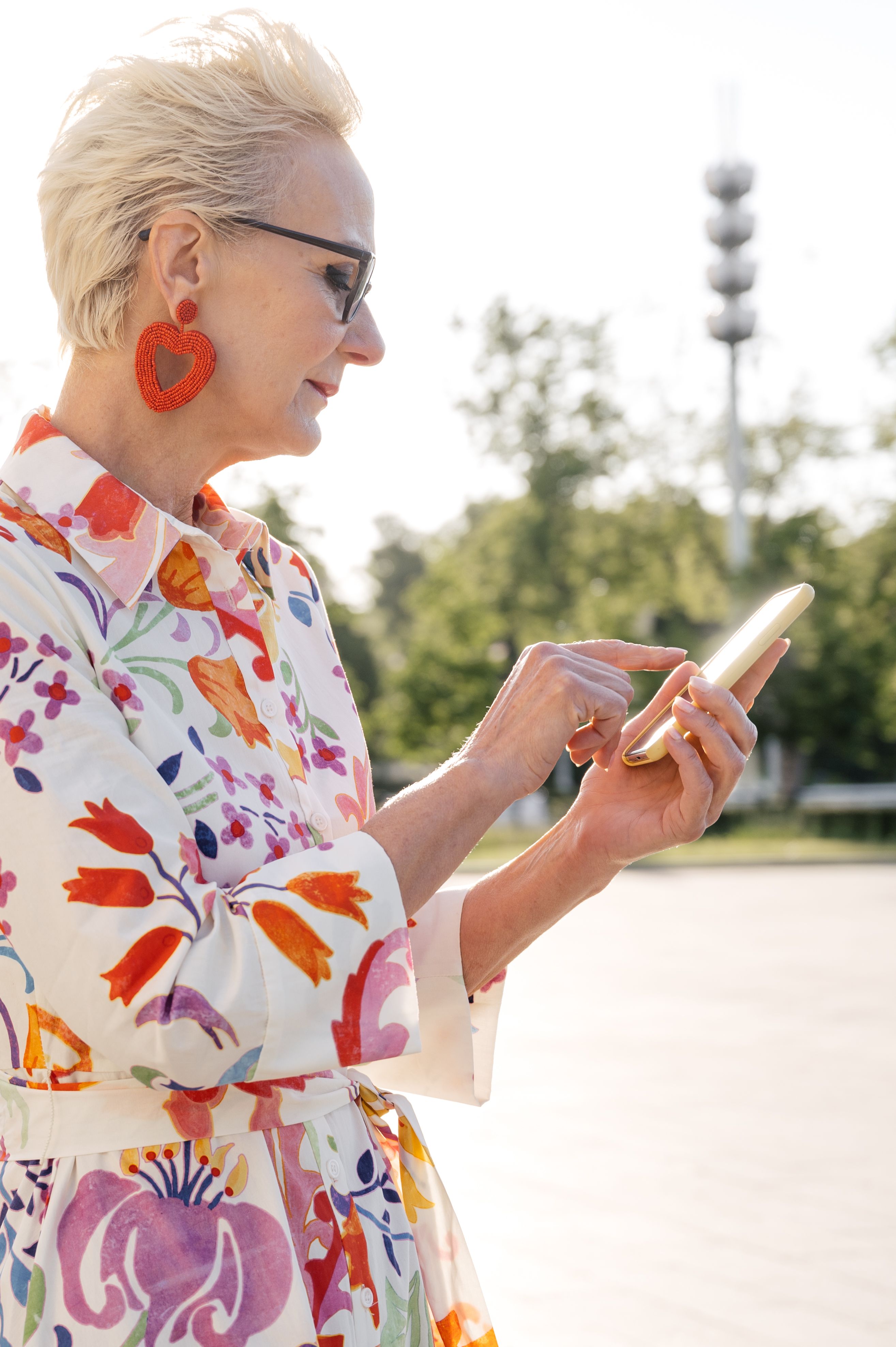 A Woman Holding a Smartphone · Free Stock Photo