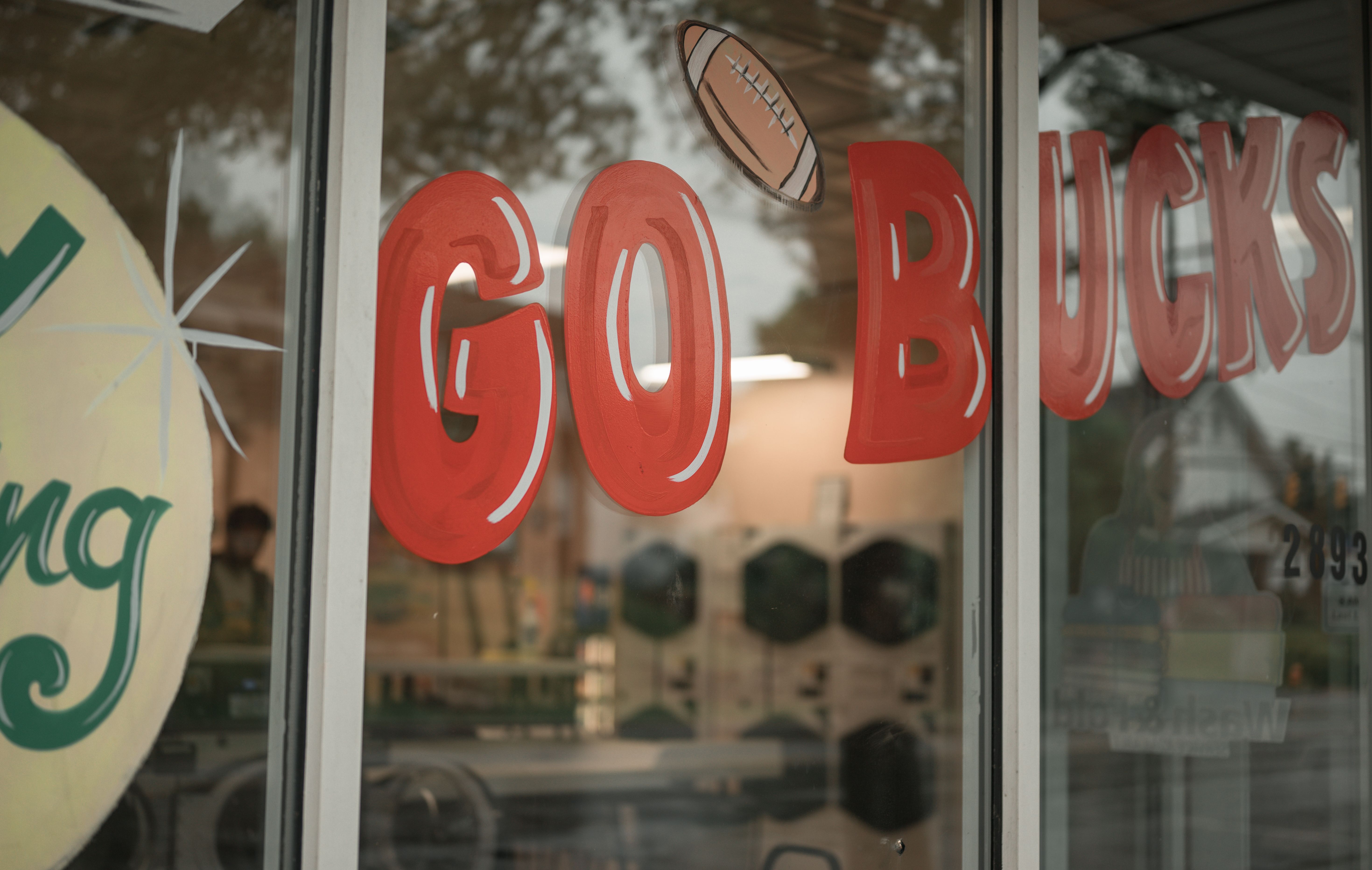 Red Text Signage on the Glass Panels · Free Stock Photo