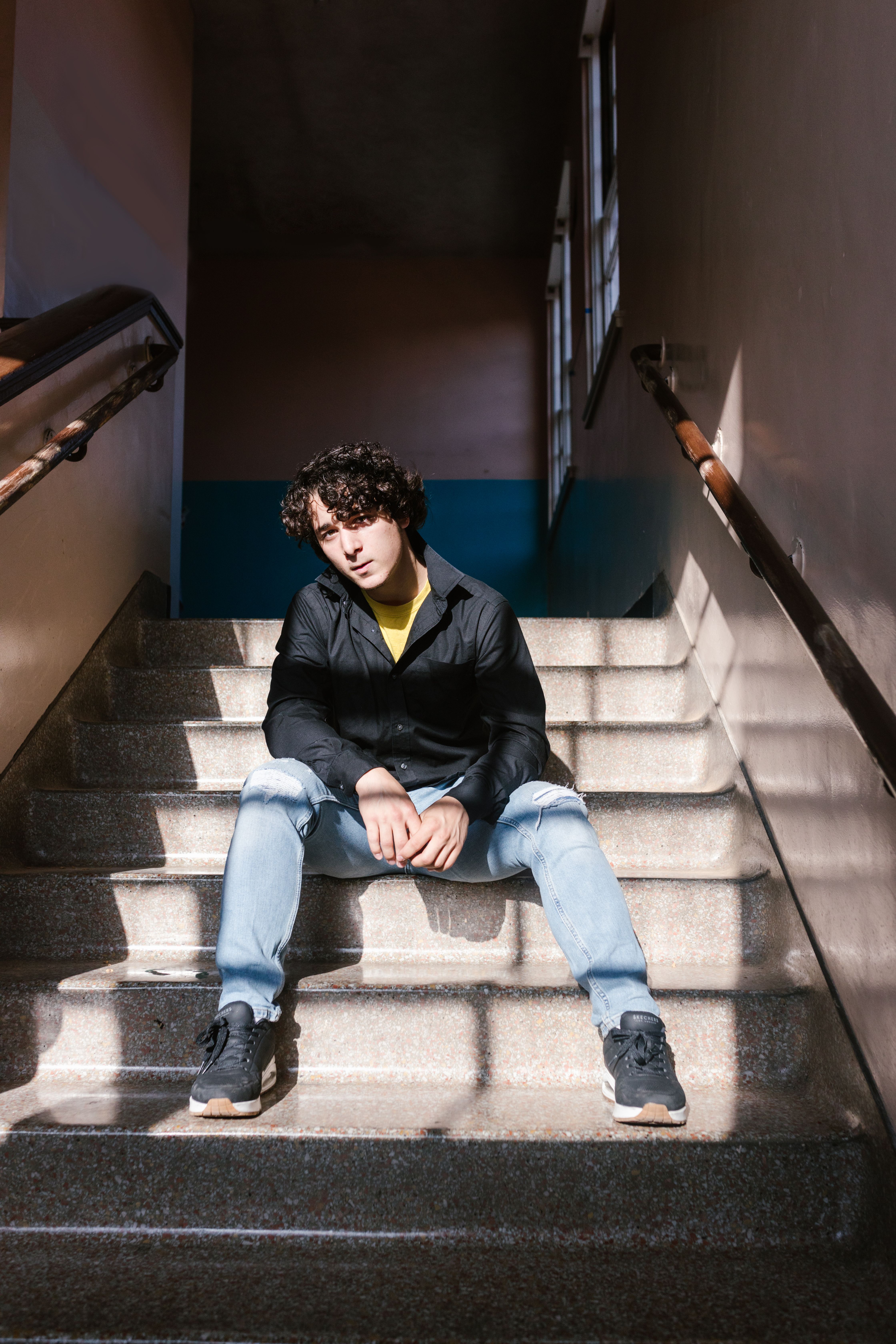 Man Sitting on the Stairs · Free Stock Photo