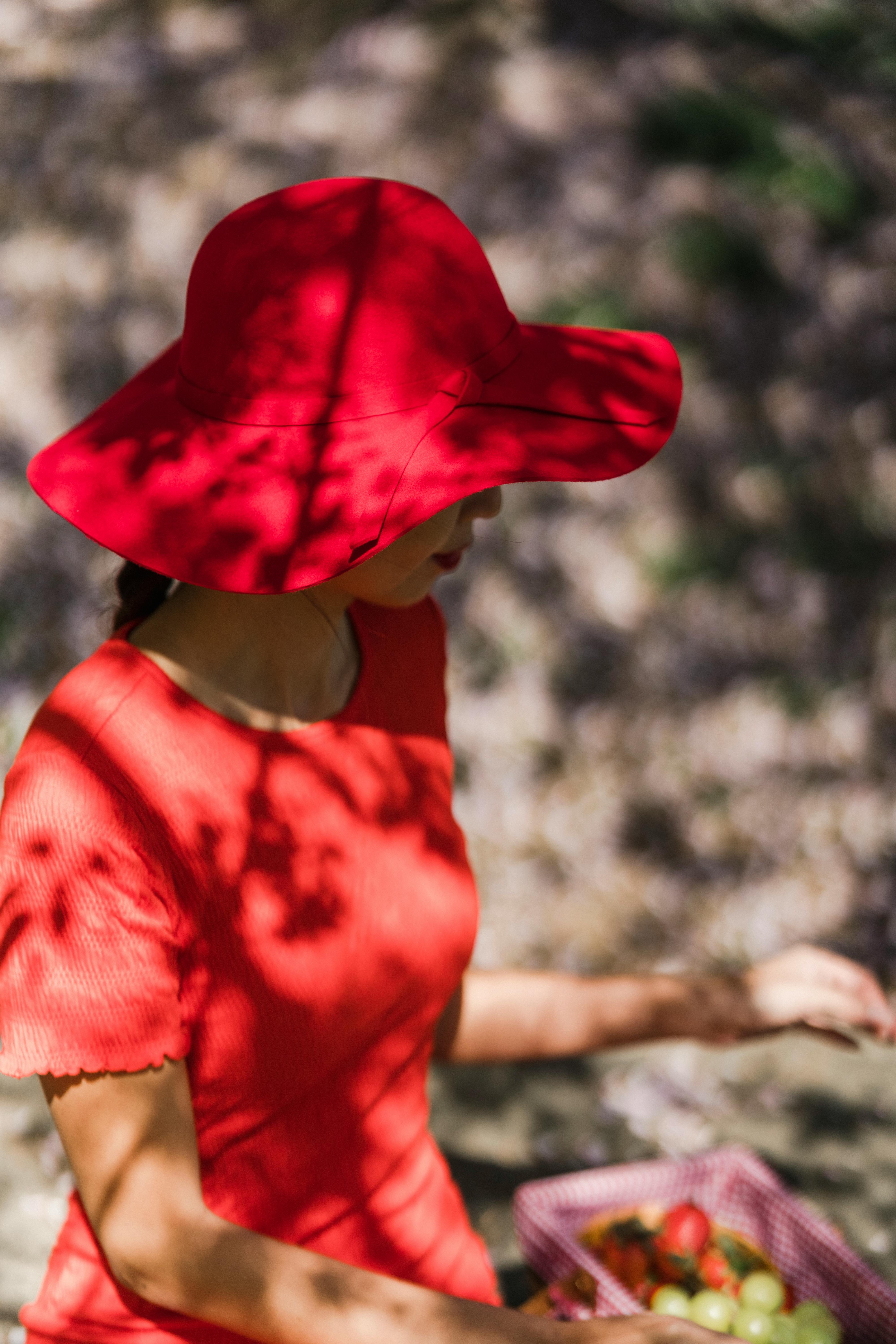 Woman Wearing Red Dress and Red Sun Hat · Free Stock Photo
